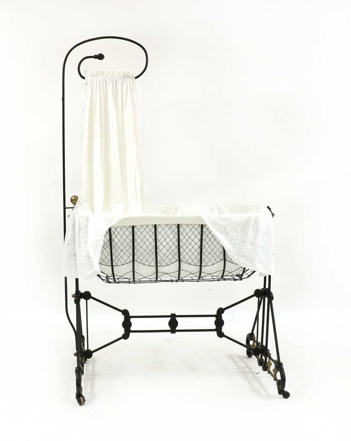 Lot 453 - A Victorian style wrought iron and brass