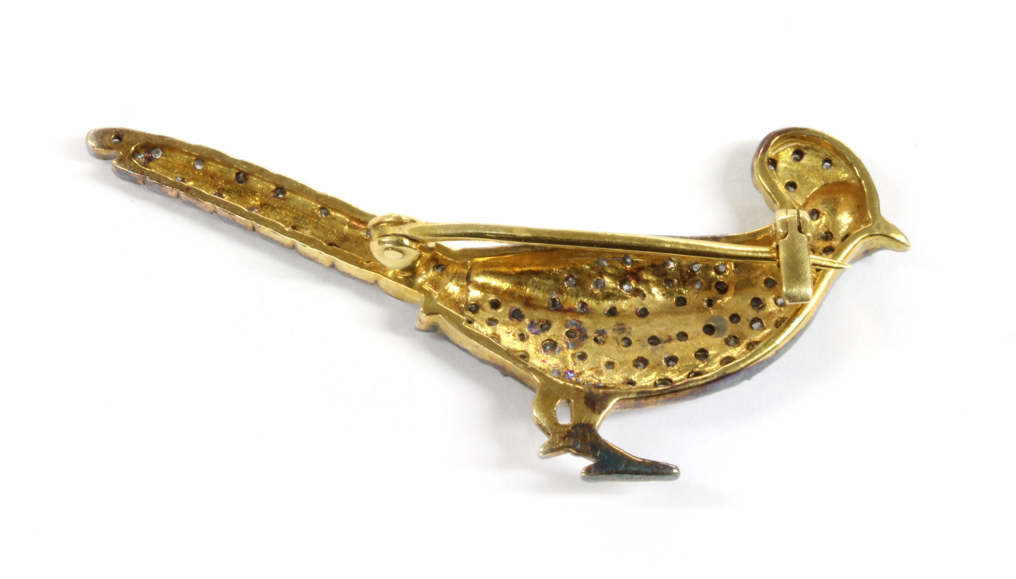 Lot 61 - A silver diamond set pheasant brooch,