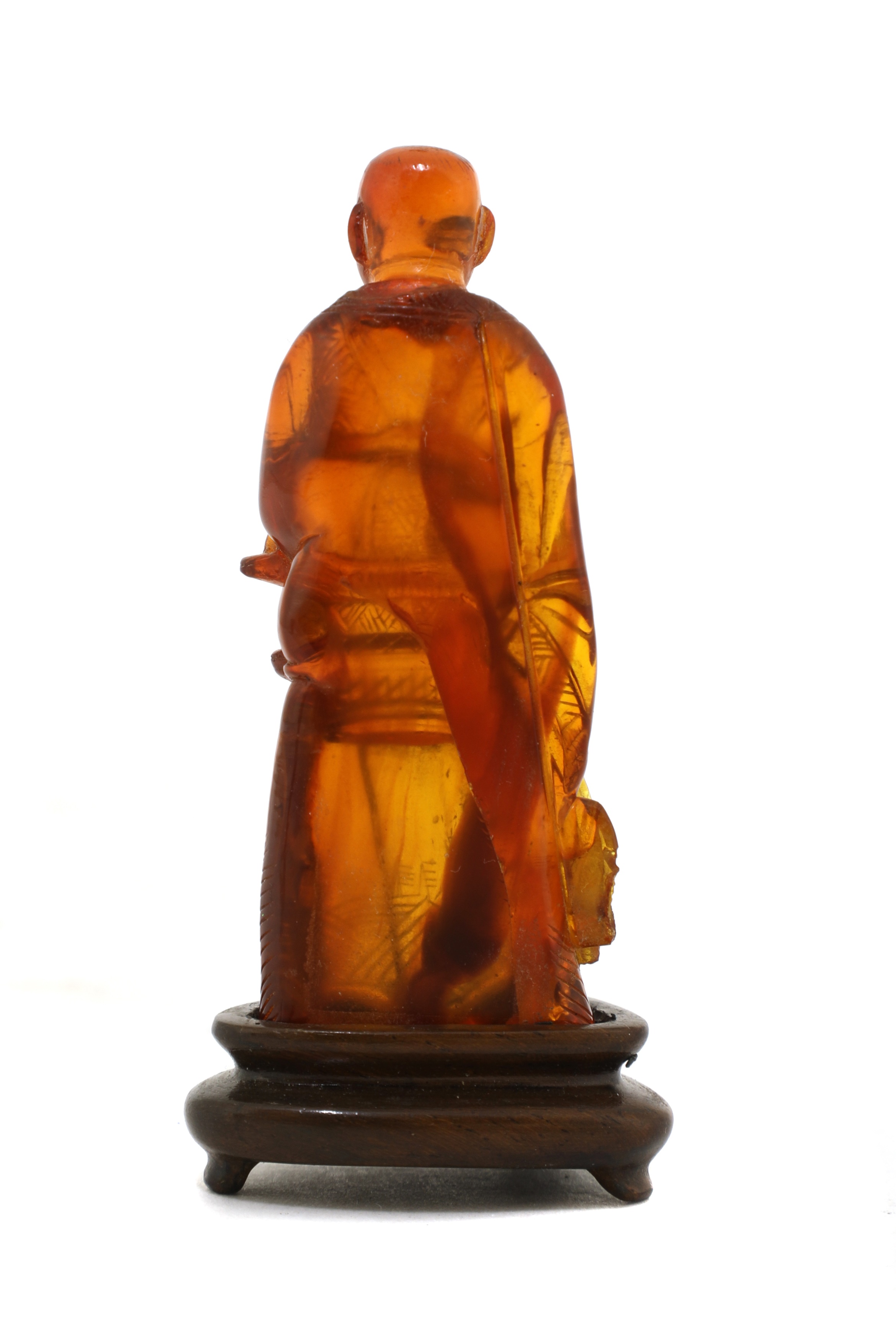 Lot 239 - A Chinese amber carving,