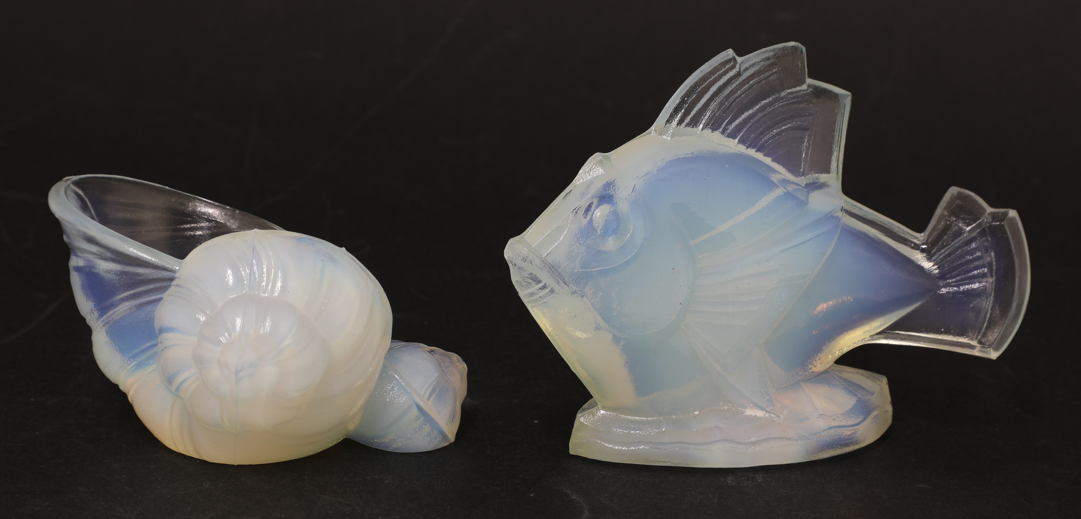 Lot 150 - Two Sabino opalescent glass paperweights,