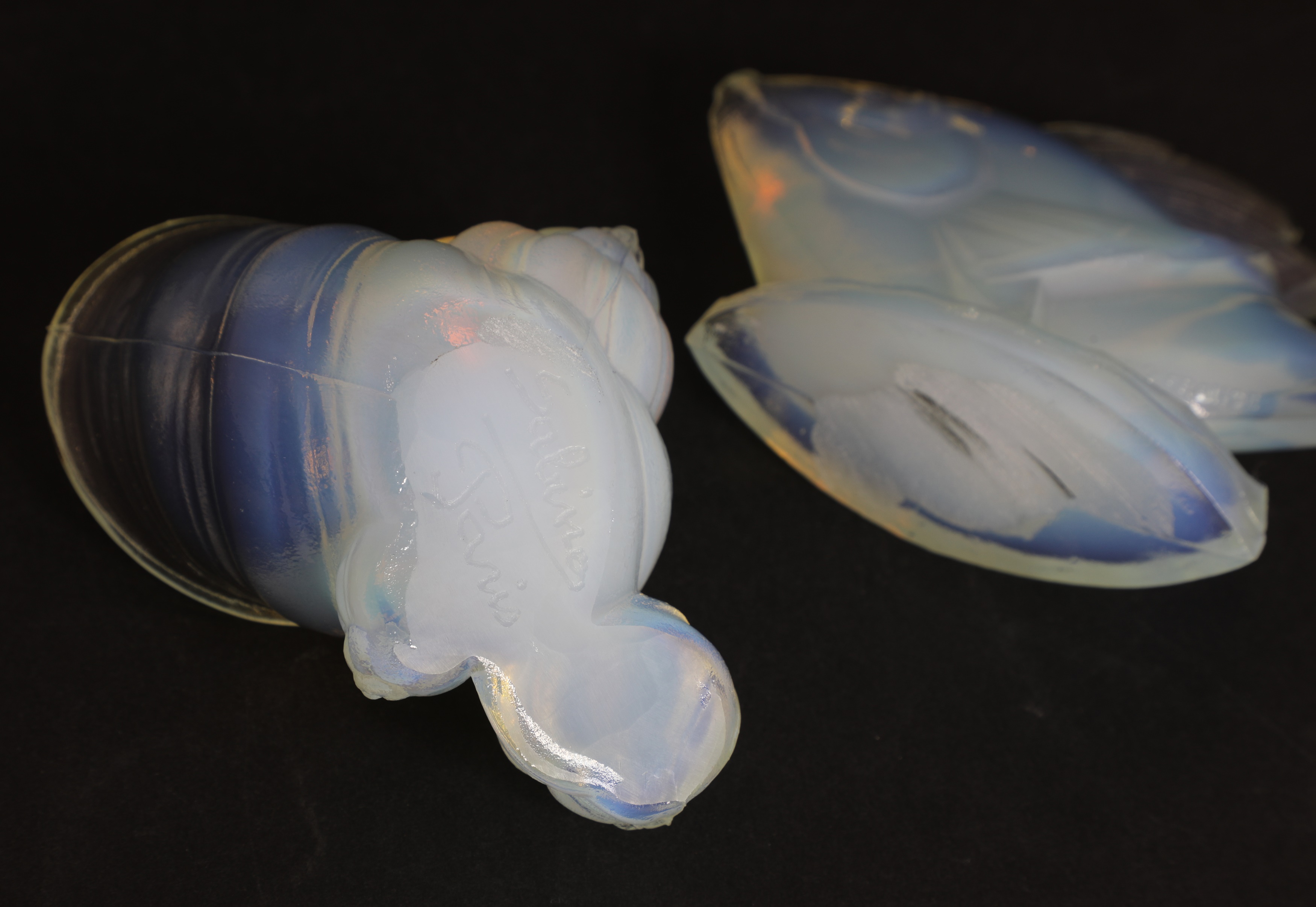 Lot 150 - Two Sabino opalescent glass paperweights,