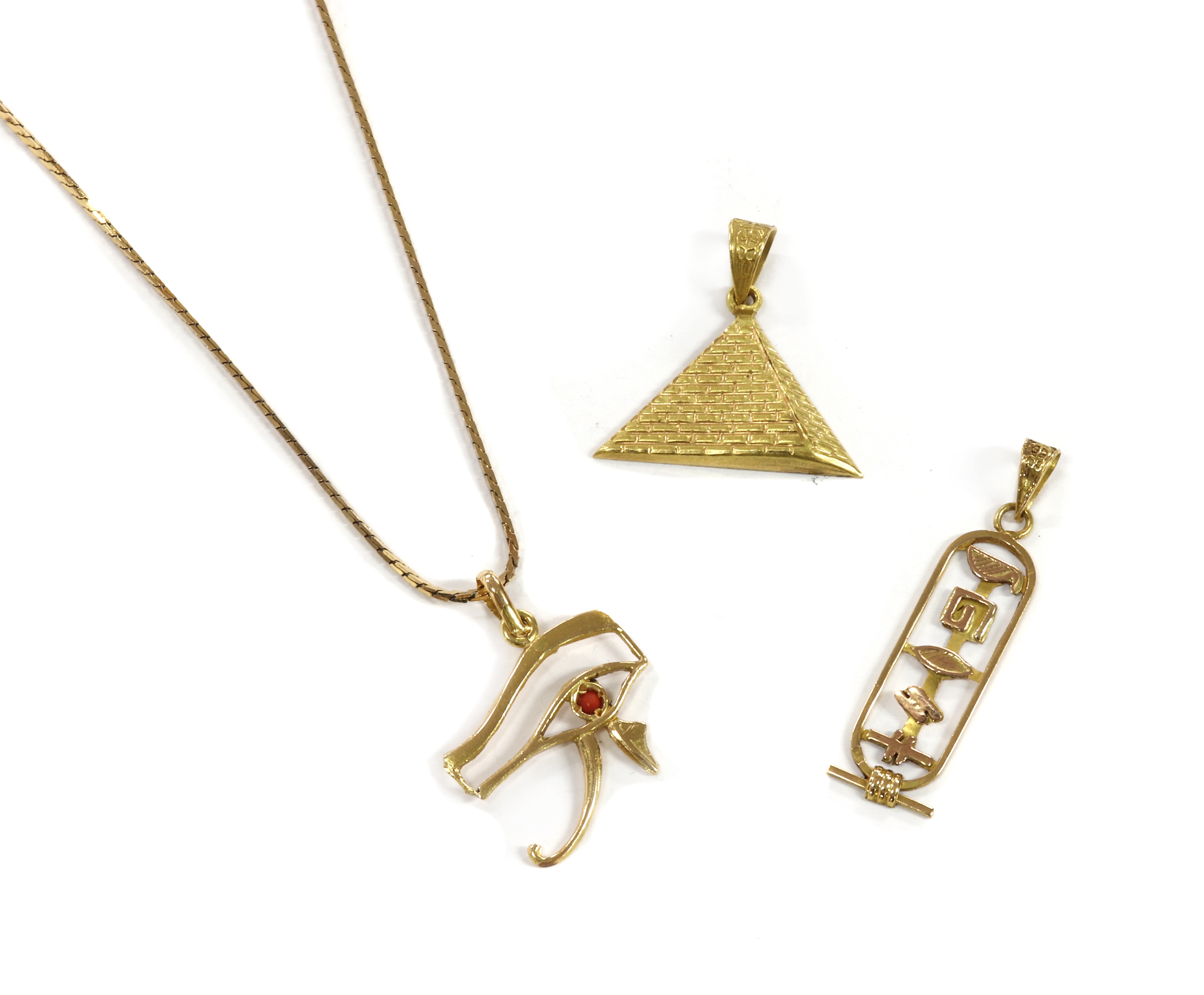 Lot 1375 - An Egyptian gold pyramid pendant,