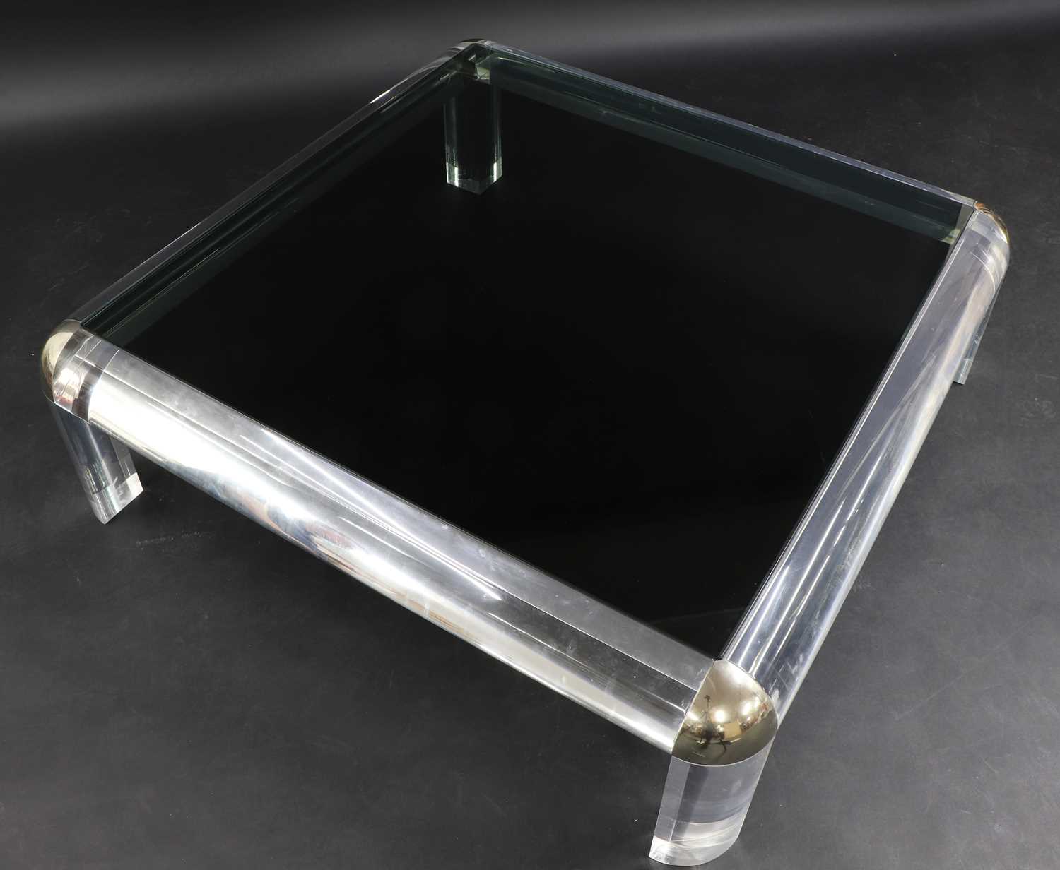 Lot 456 - A Lucite coffee table,