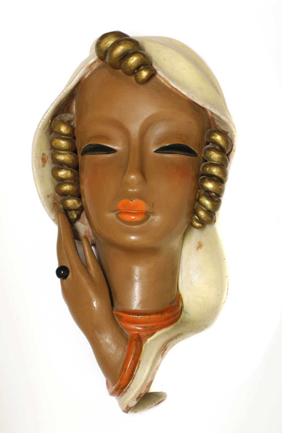 A Goldscheider pottery wall mask | Barnebys