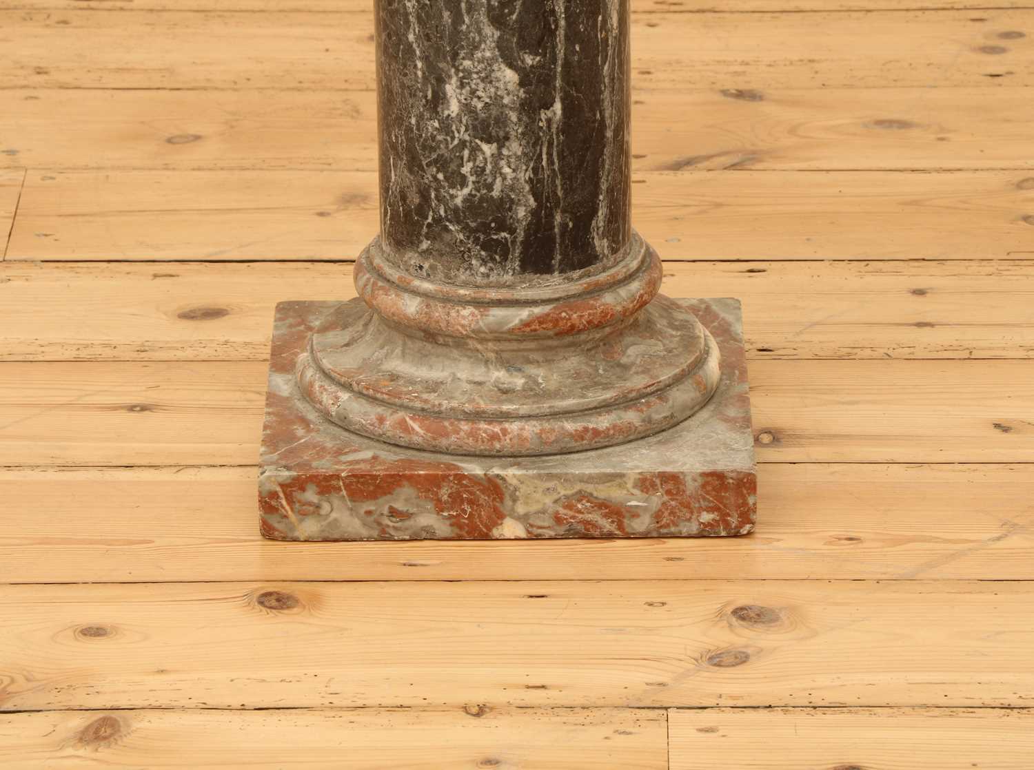 Lot 68 - A Continental black and red marble plinth,