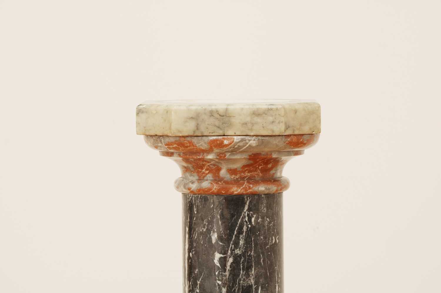 Lot 68 - A Continental black and red marble plinth,