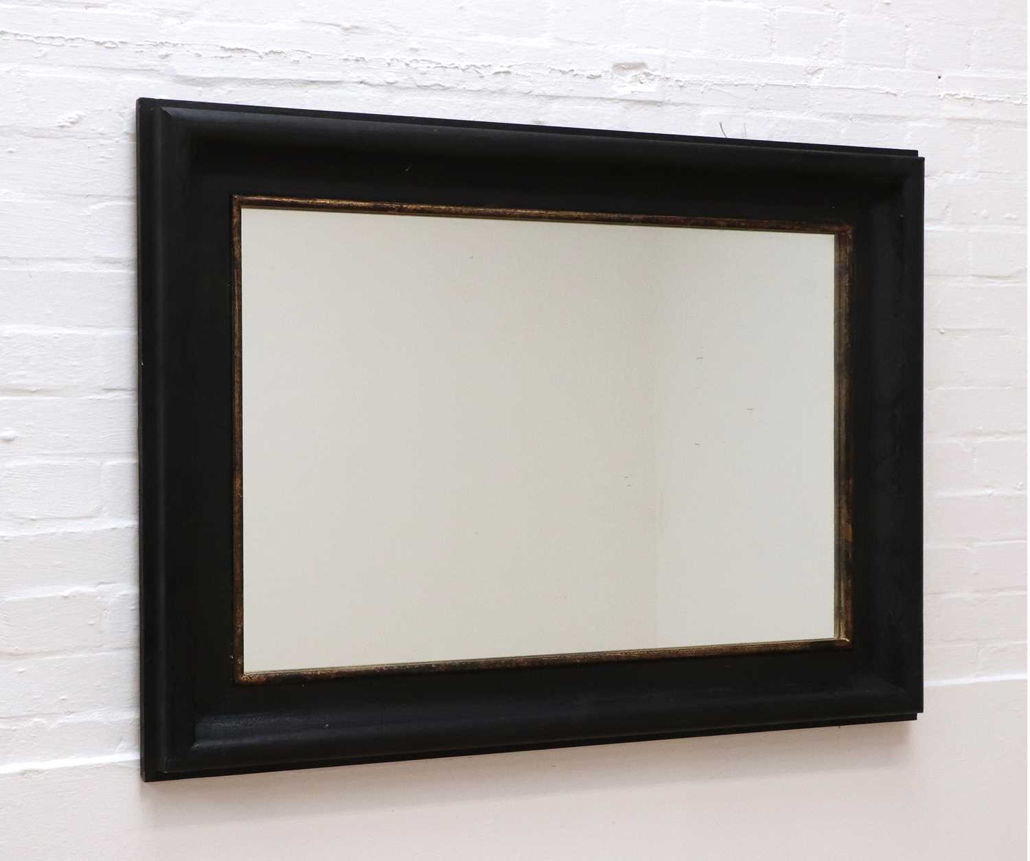 Lot 273 - A rectangular mirror by OKA,