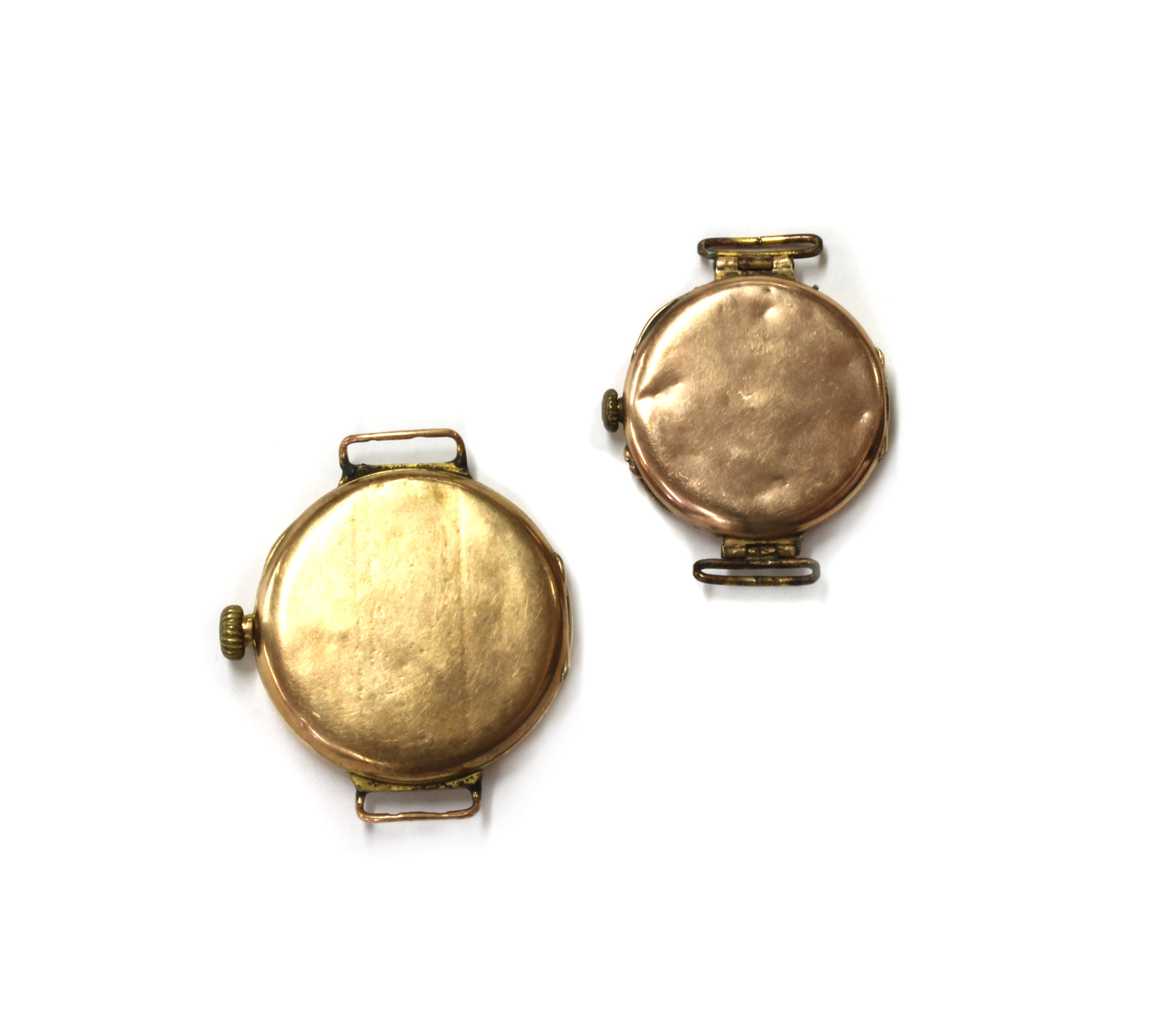 Lot 227 - Two gold mechanical watch heads,