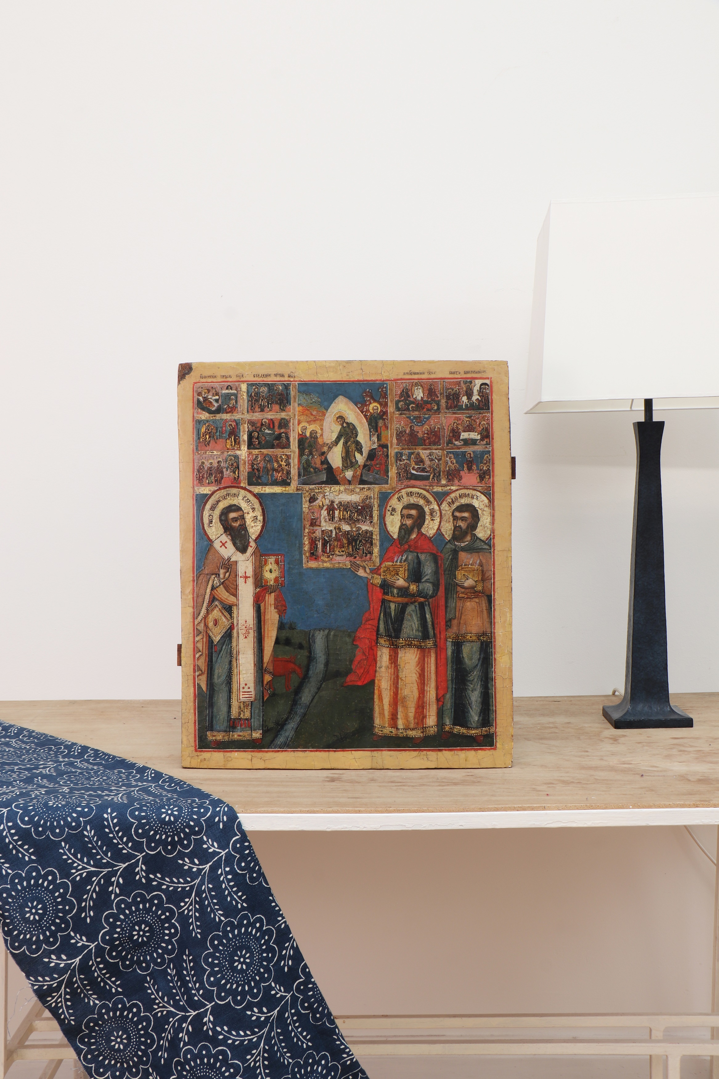 Lot 27 - A large icon of three saints venerating icons,