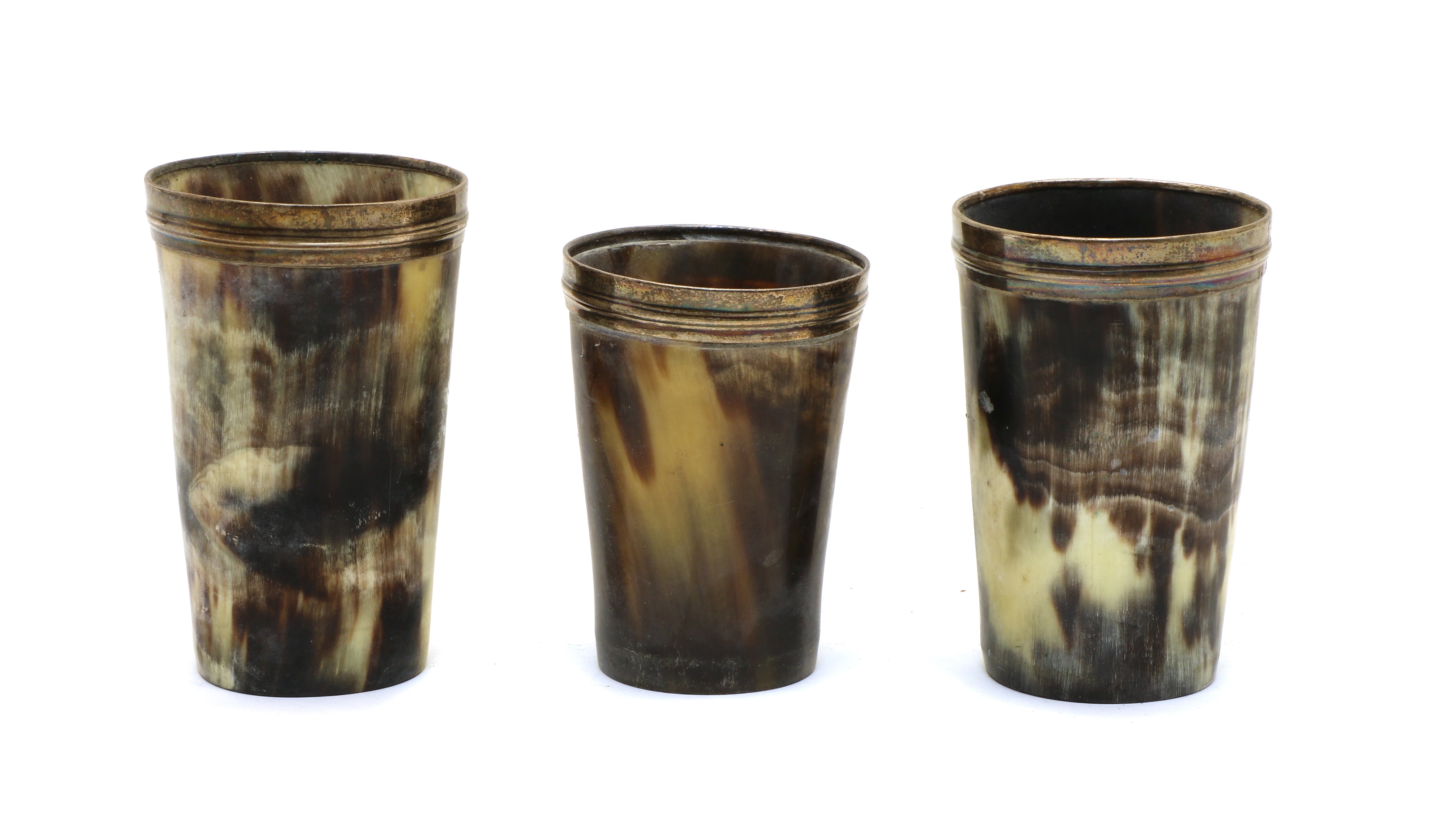 Lot 15 - Three George IV graduated horn beakers,