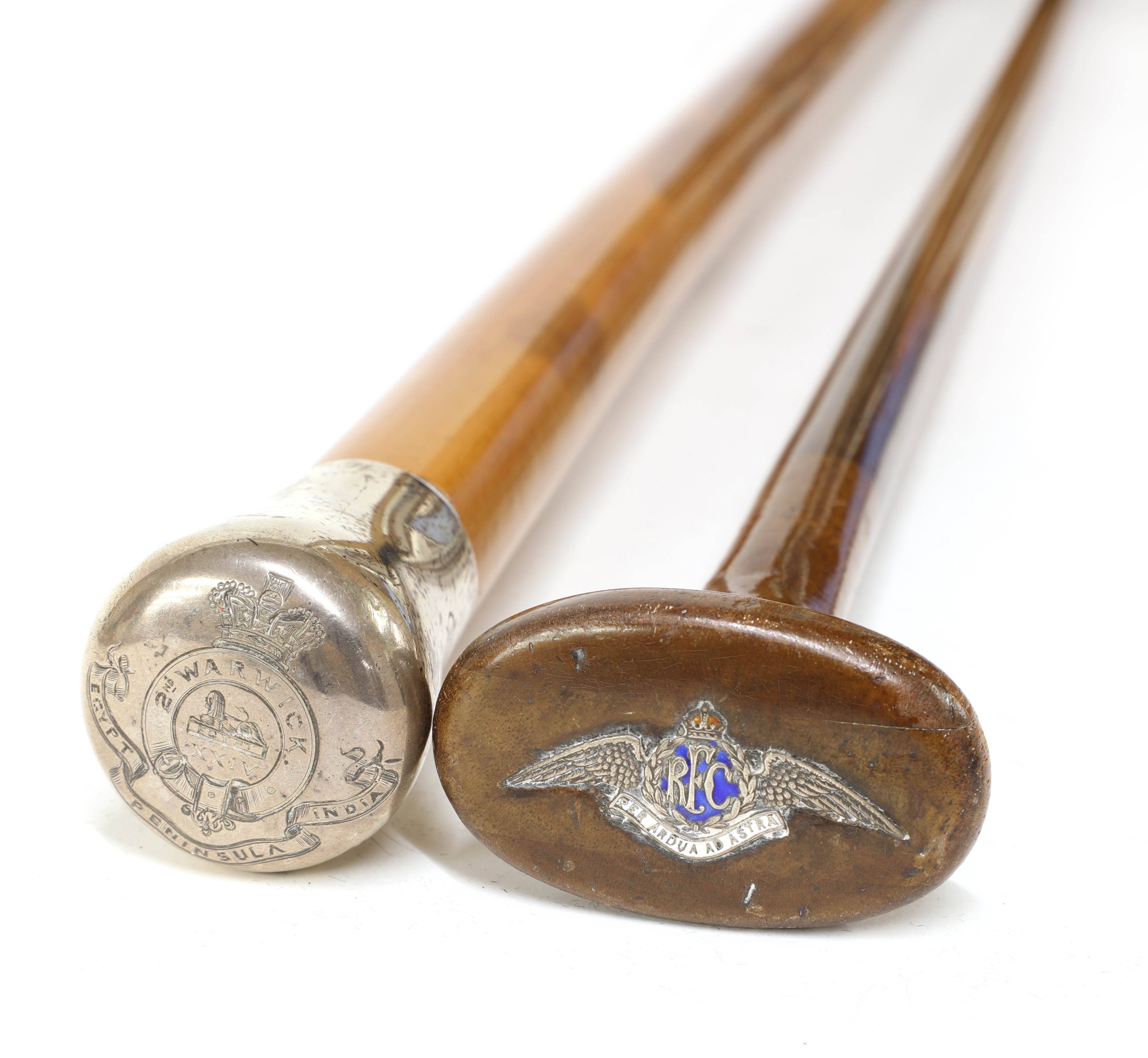 Lot 65 - Four military walking sticks,