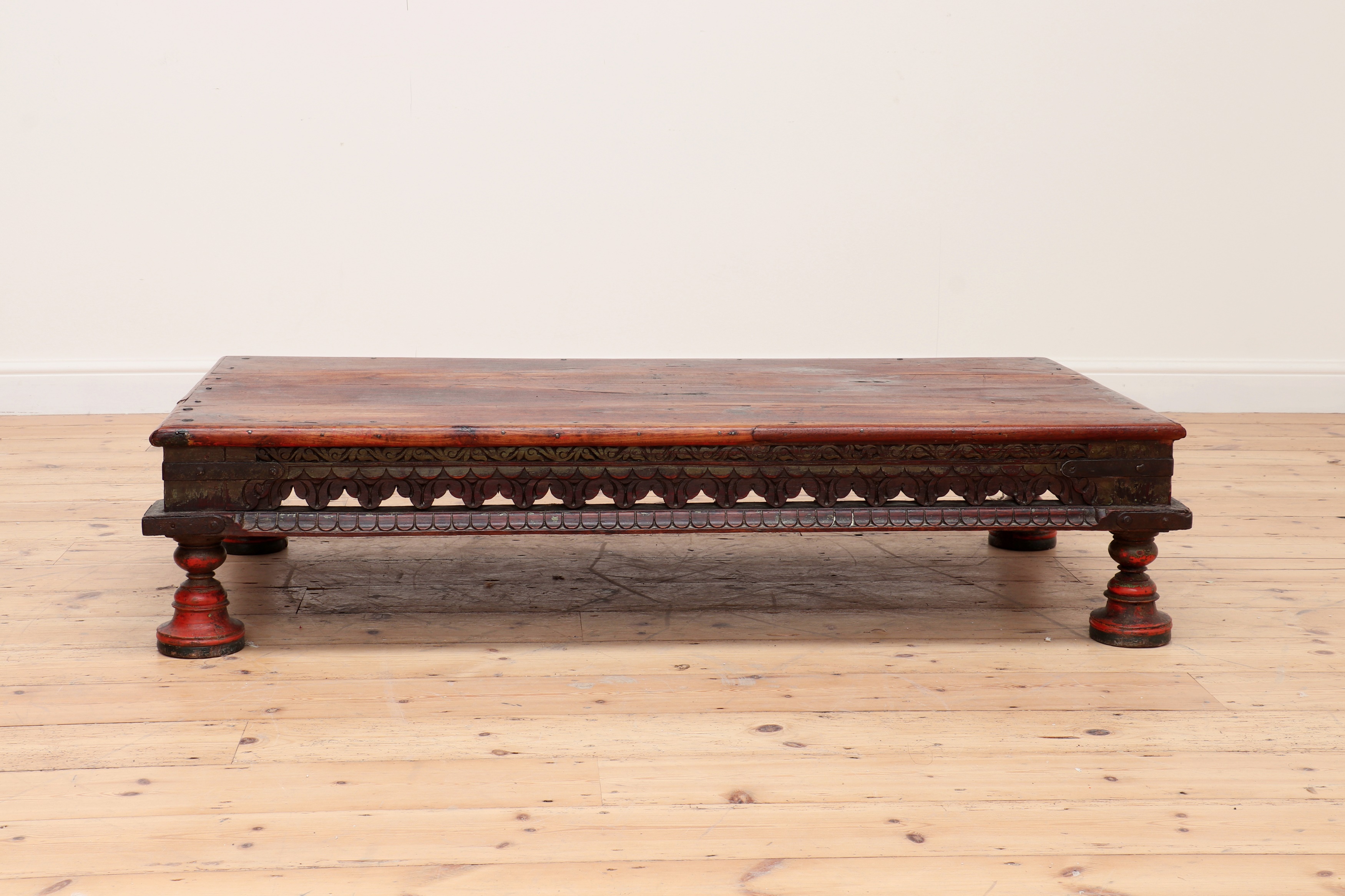 Lot 14 - An Indian hardwood low coffee table,