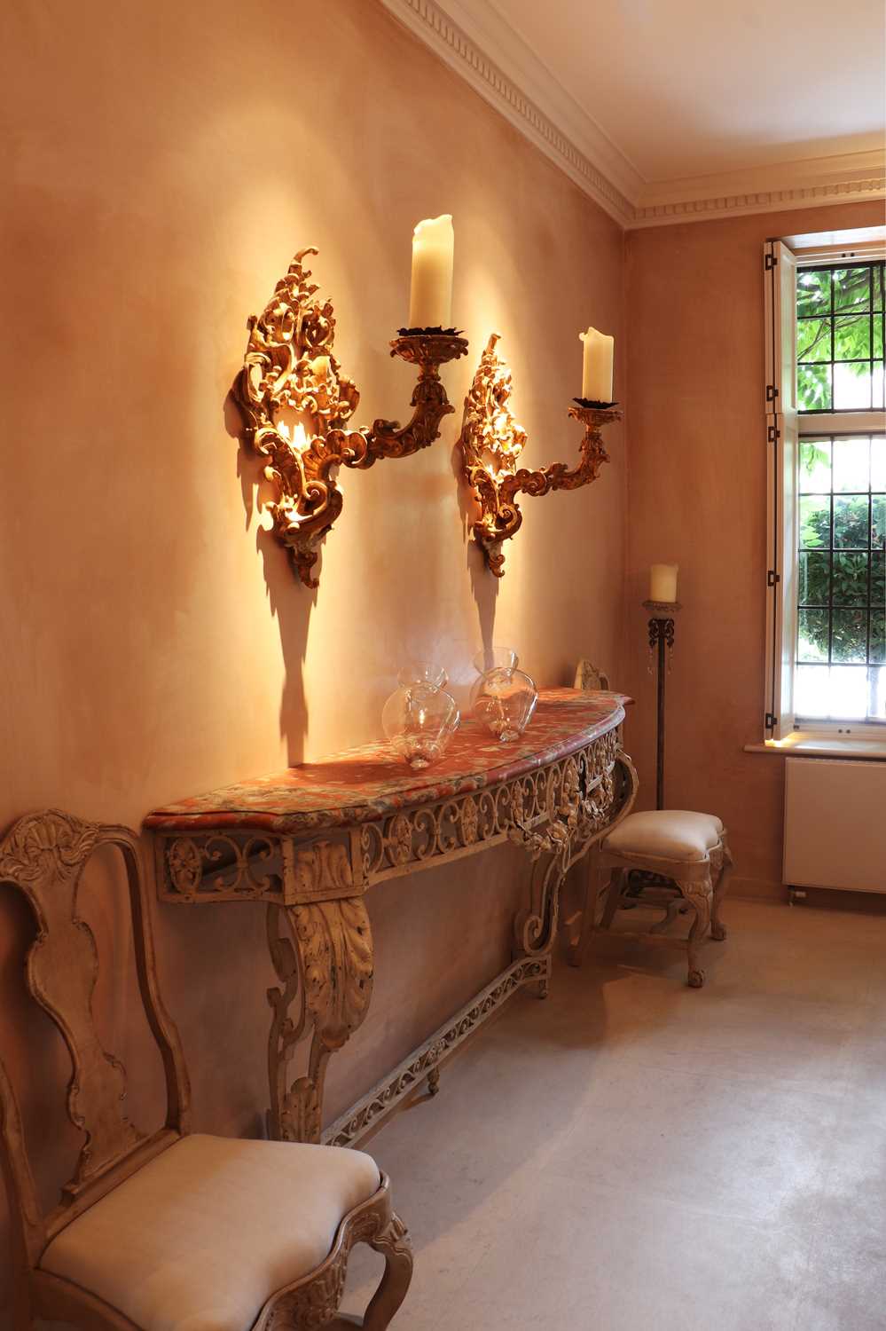 Lot 30 - A pair of large giltwood wall appliqués,