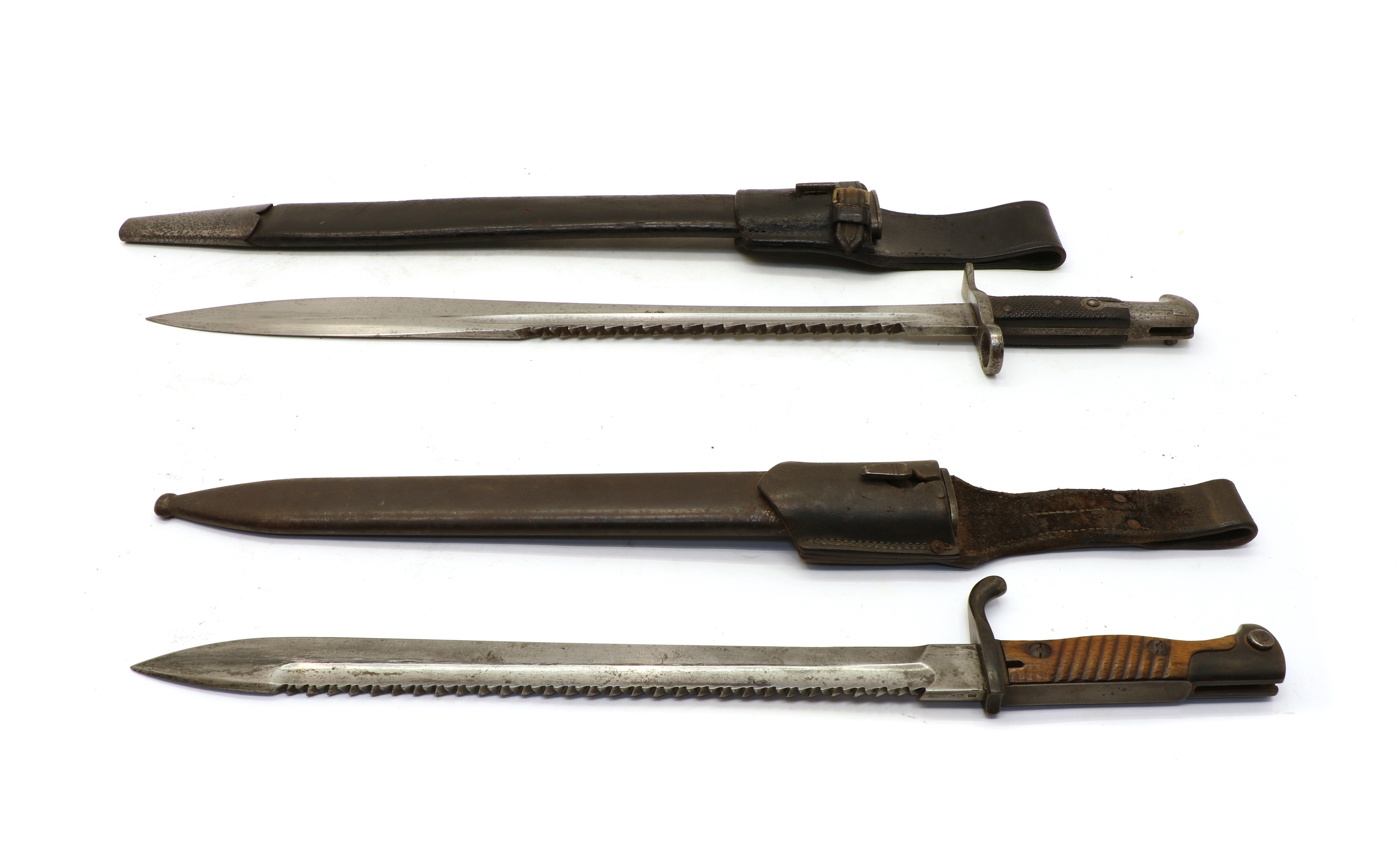 Lot 28 - Two WWl saw back bayonets