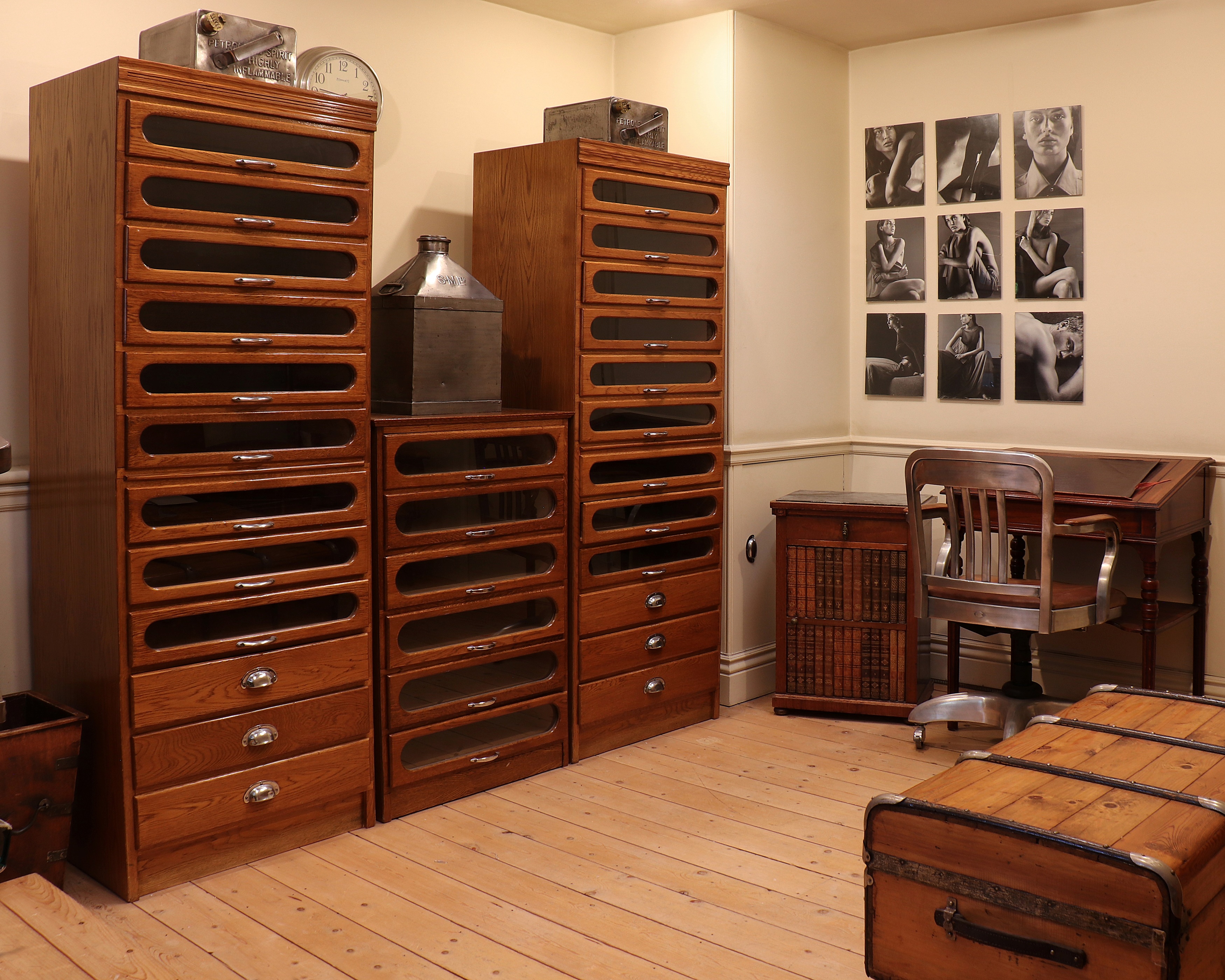 Lot 48 - An oak and glazed haberdasher's cabinet,