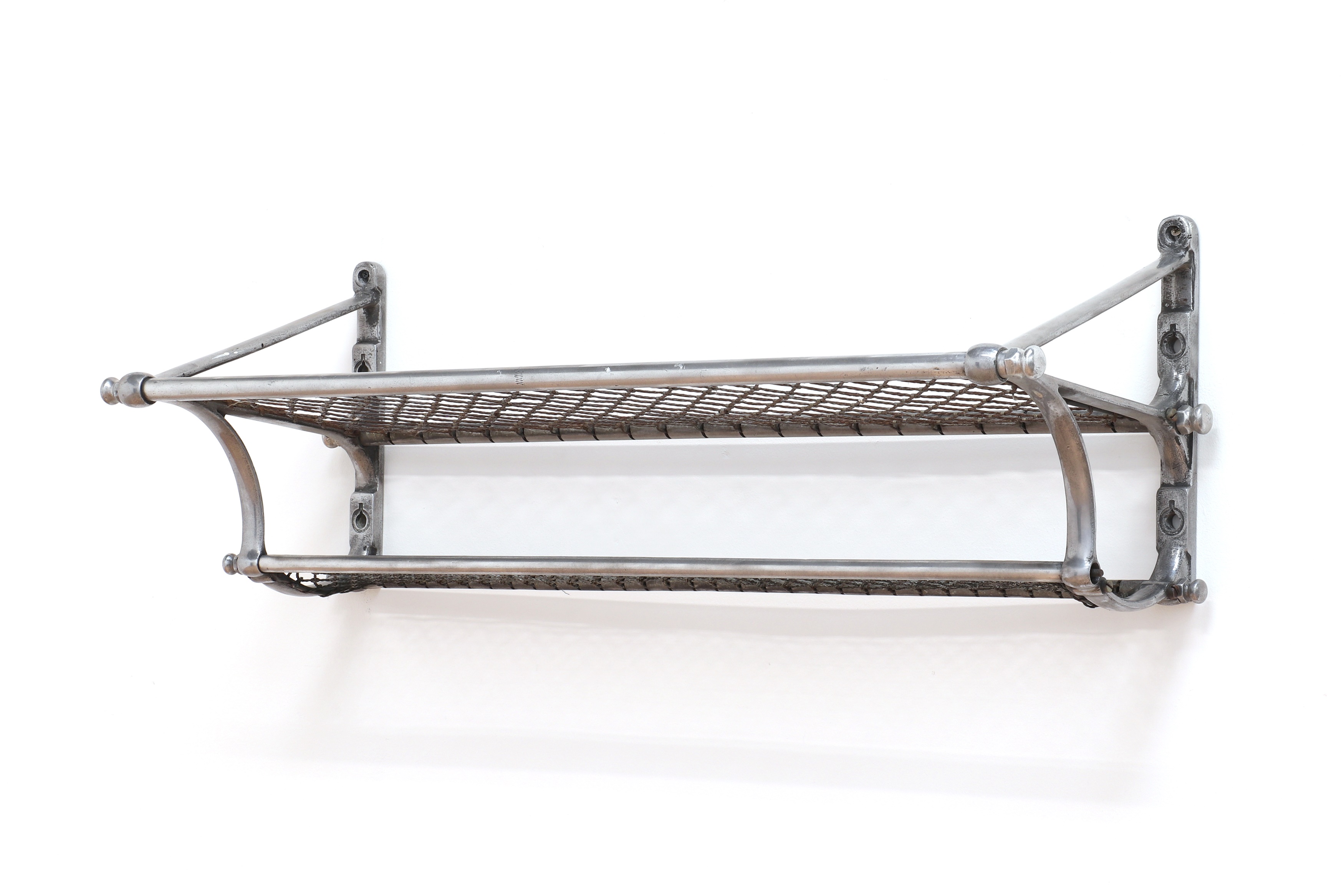 Lot 52 - A polished steel luggage rack,