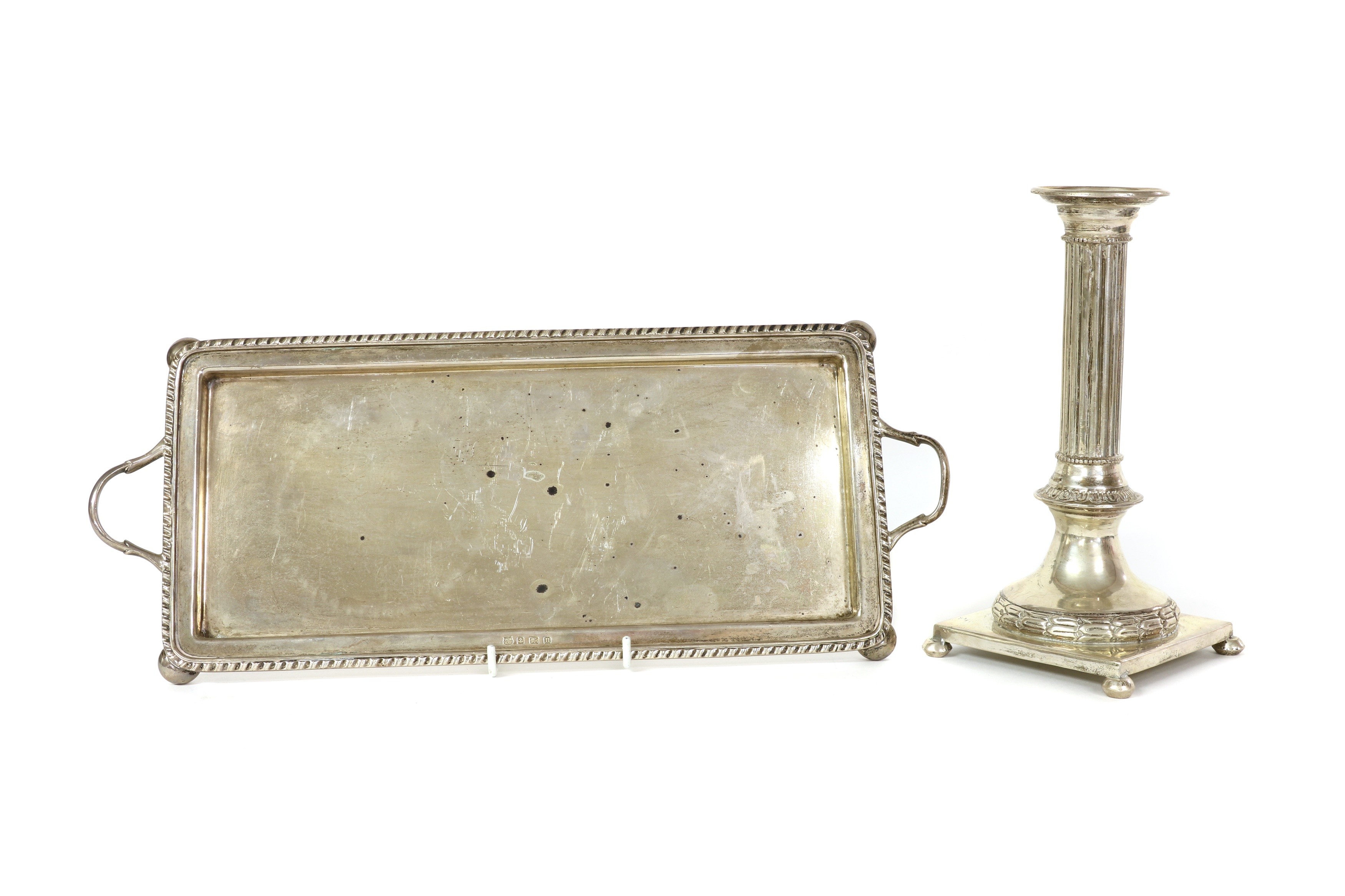Lot 25 - A silver twin handled tray,
