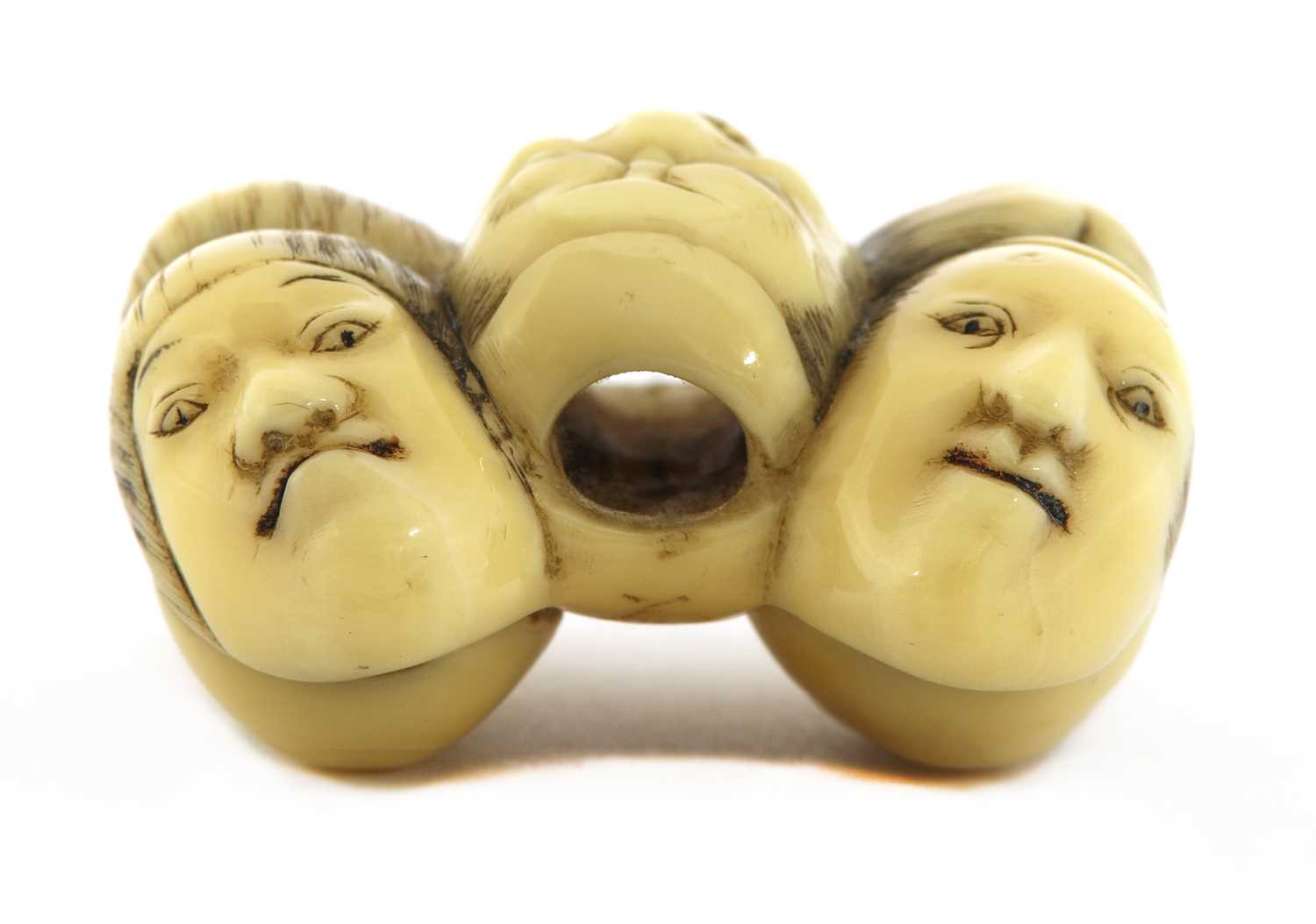 Lot 423 - A Japanese ivory netsuke,