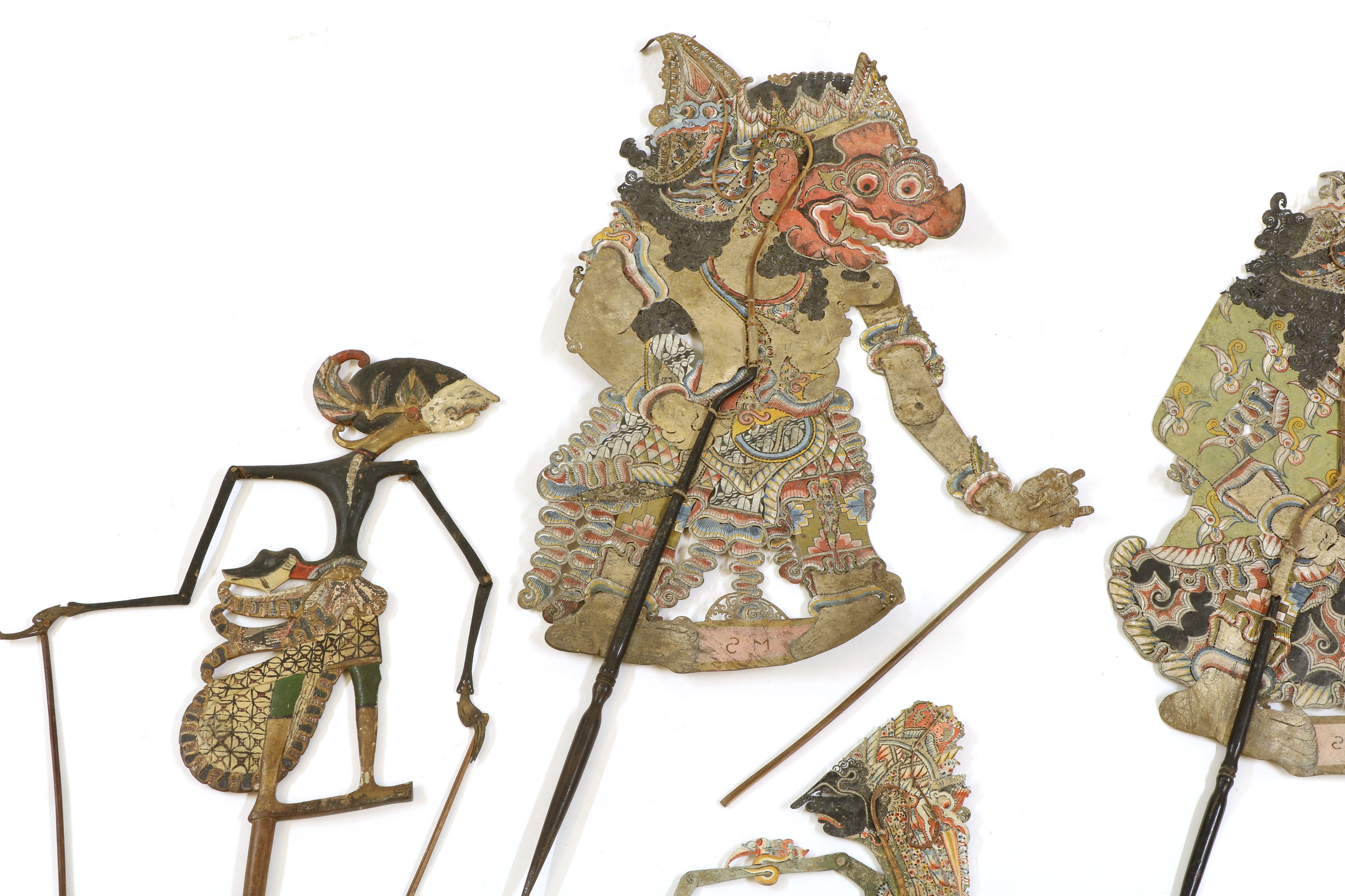 Lot 259 - A collection of Wayang Kulit puppets,