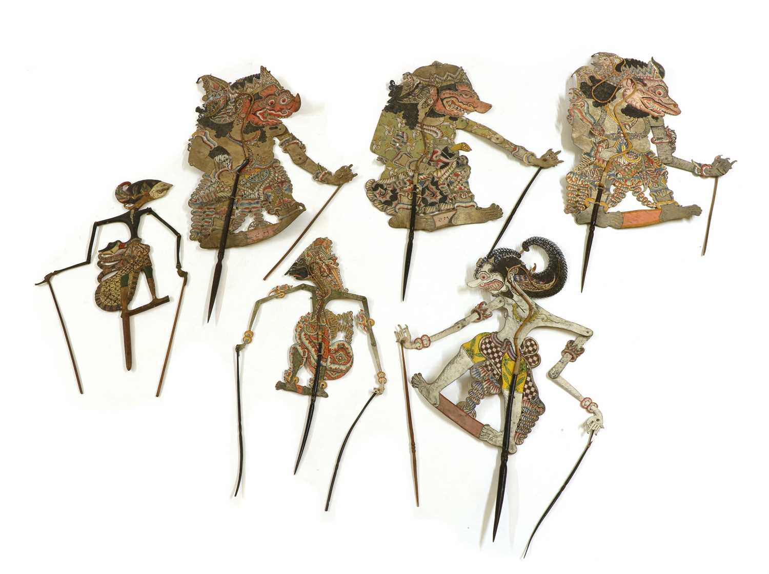 A collection of Wayang Kulit puppets | Barnebys