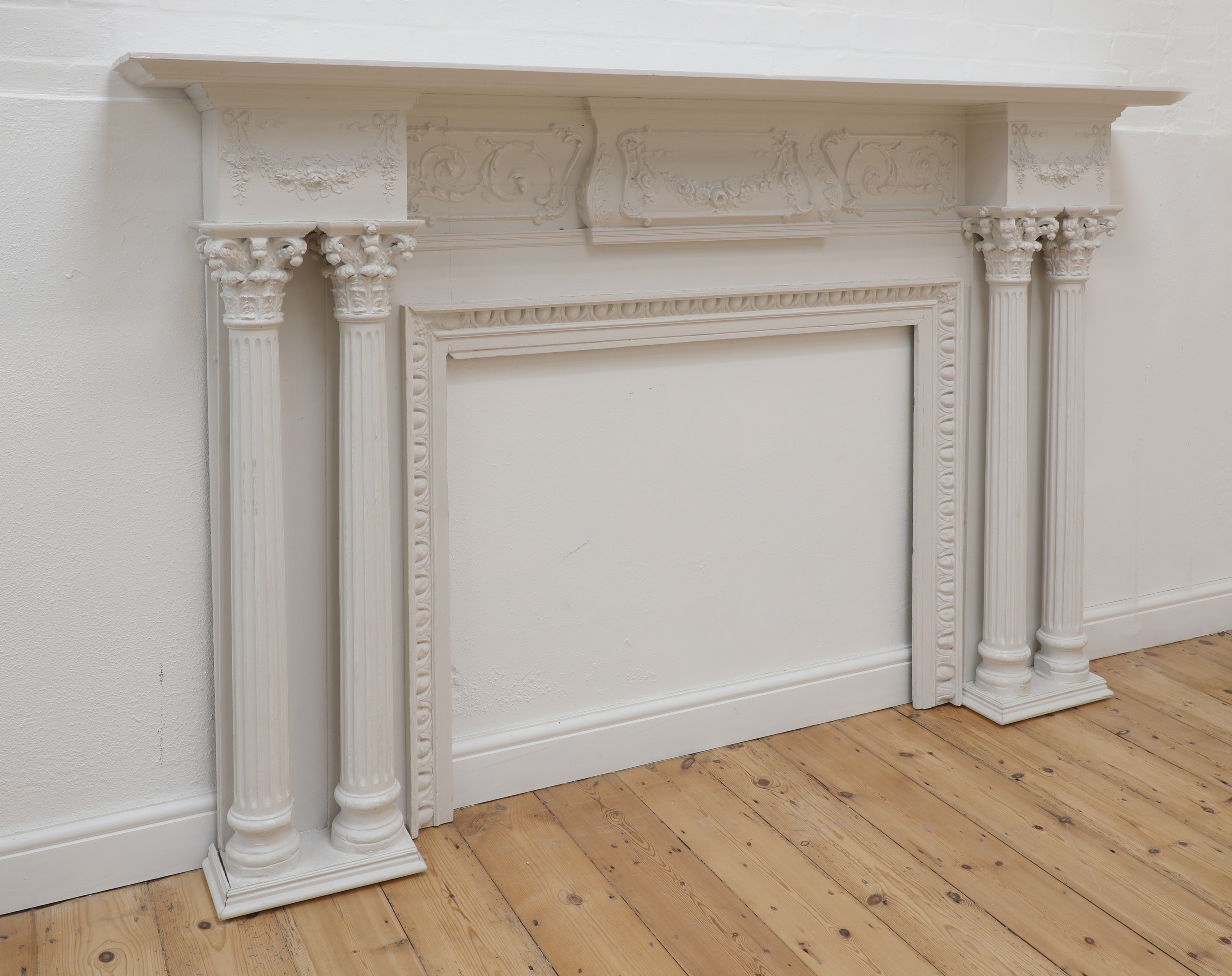 Lot 222 - A white-painted fire surround,