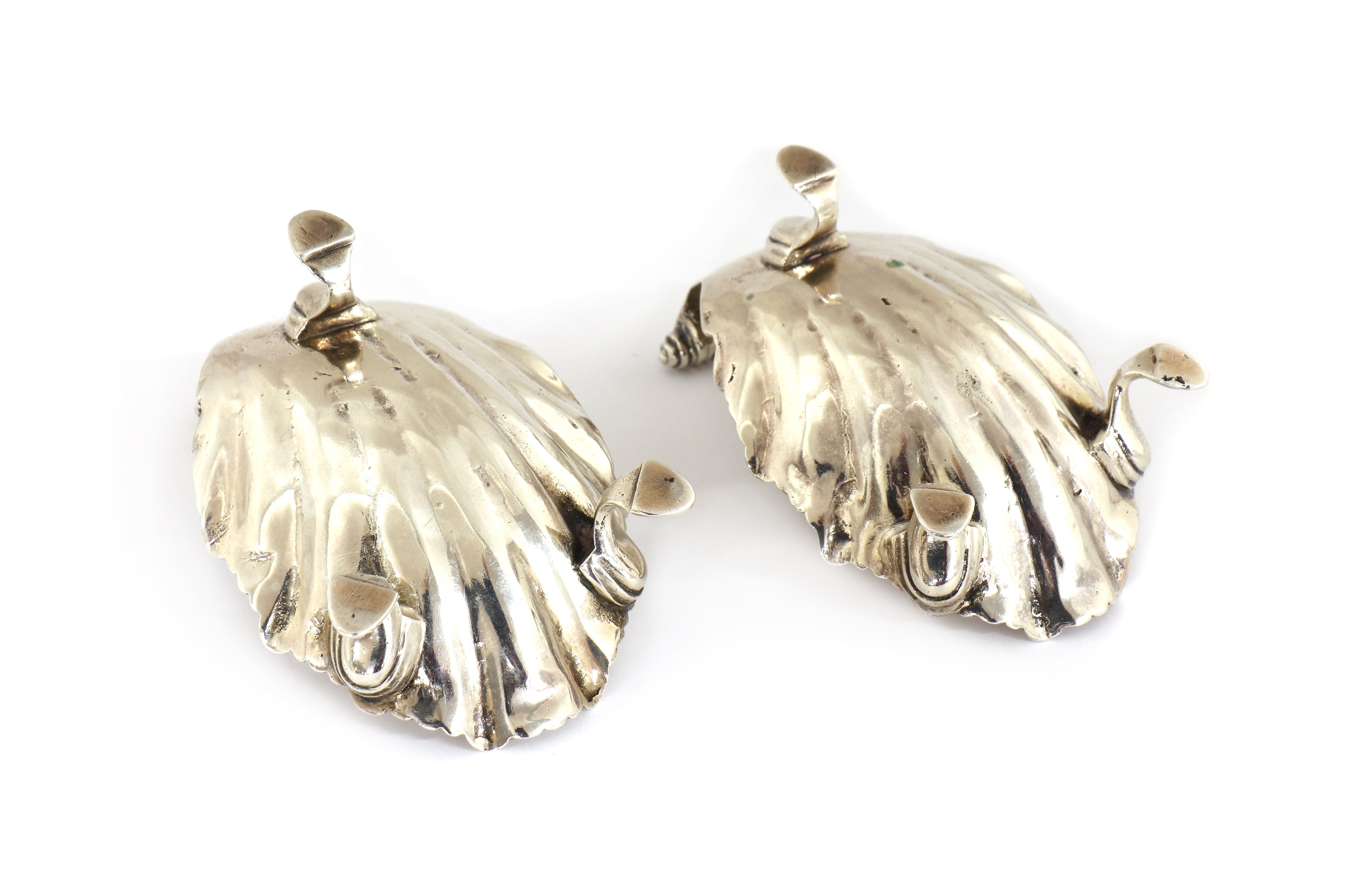 Lot 192 - A pair of cast white metal shell butter