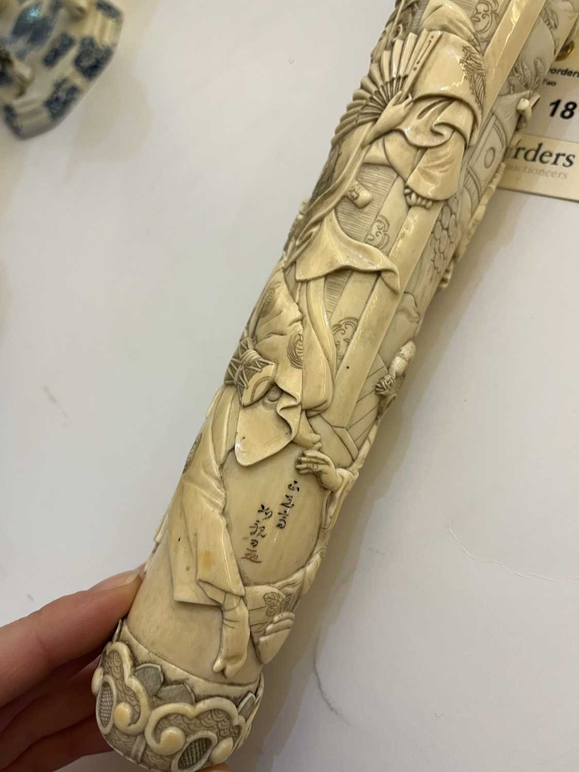 Lot 181 - A Japanese carved ivory short sword,