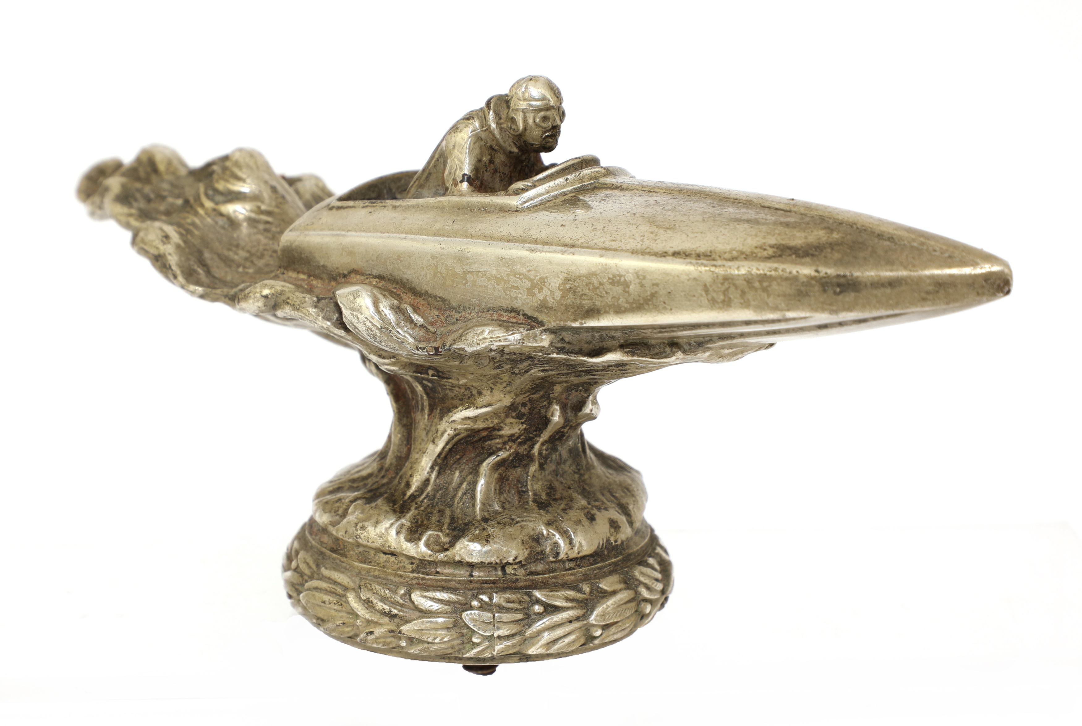 Lot 245 - A silver bronze 'speedboat' car mascot,