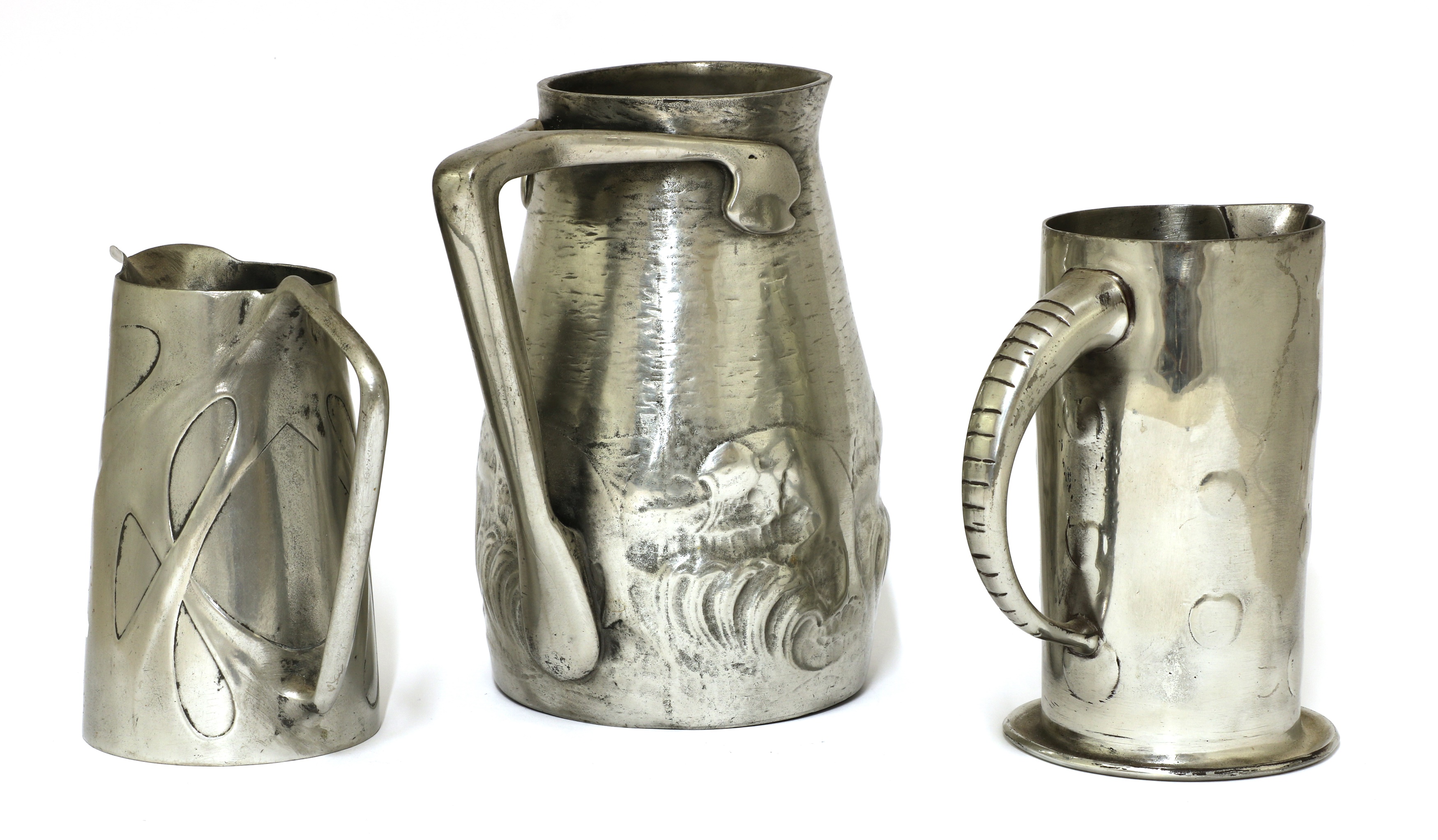 Lot 160 - An Arts and Crafts pewter jug,