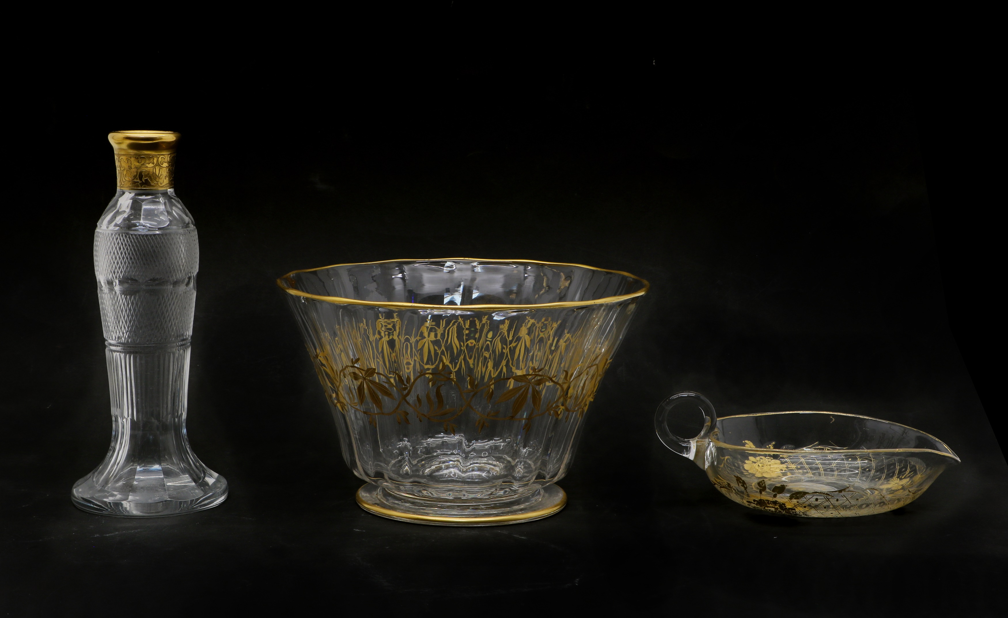 Lot 115 - A Moser cut and gilt glass bottle,