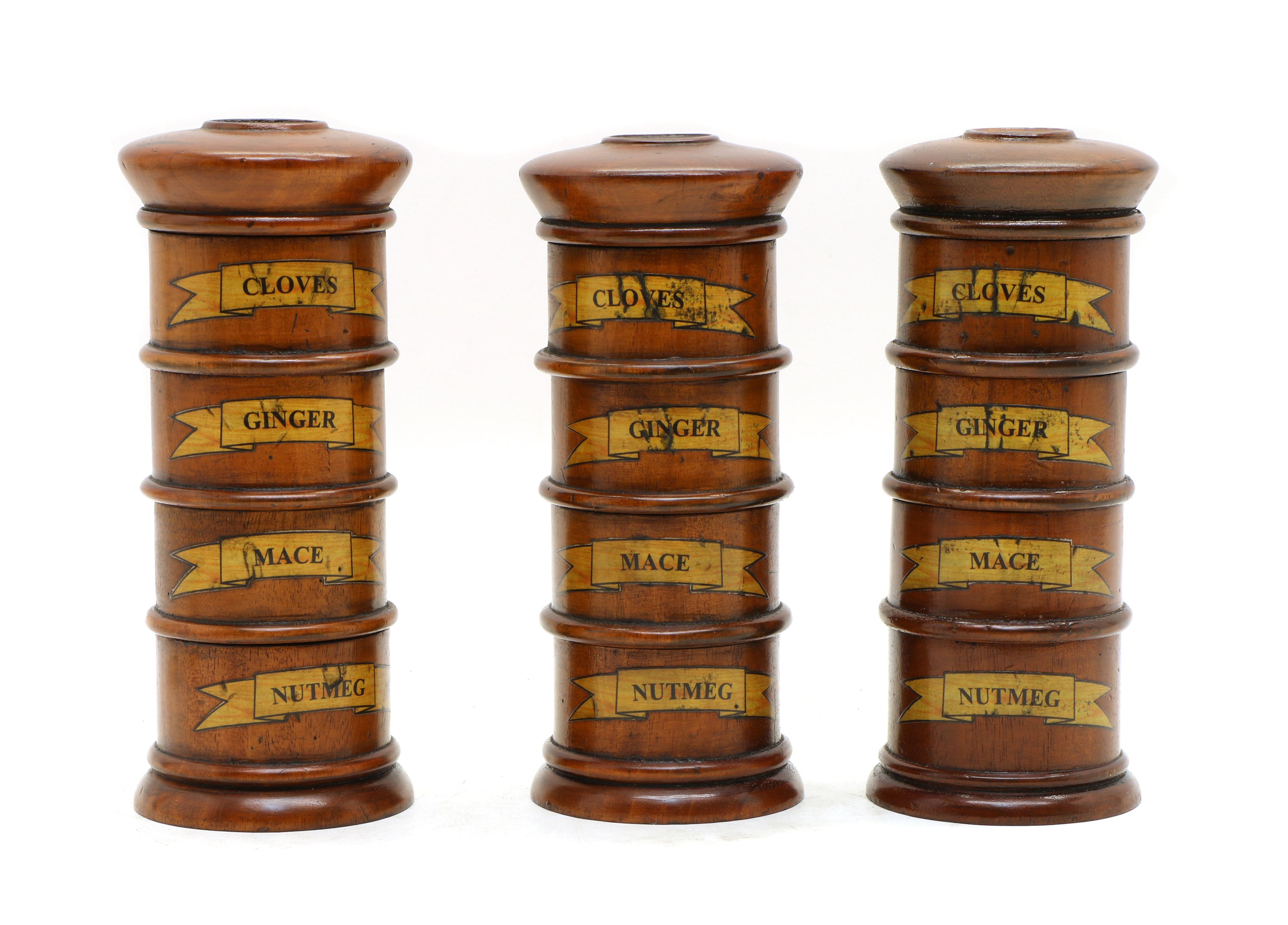 Lot 319 - A set of three treen spice towers,