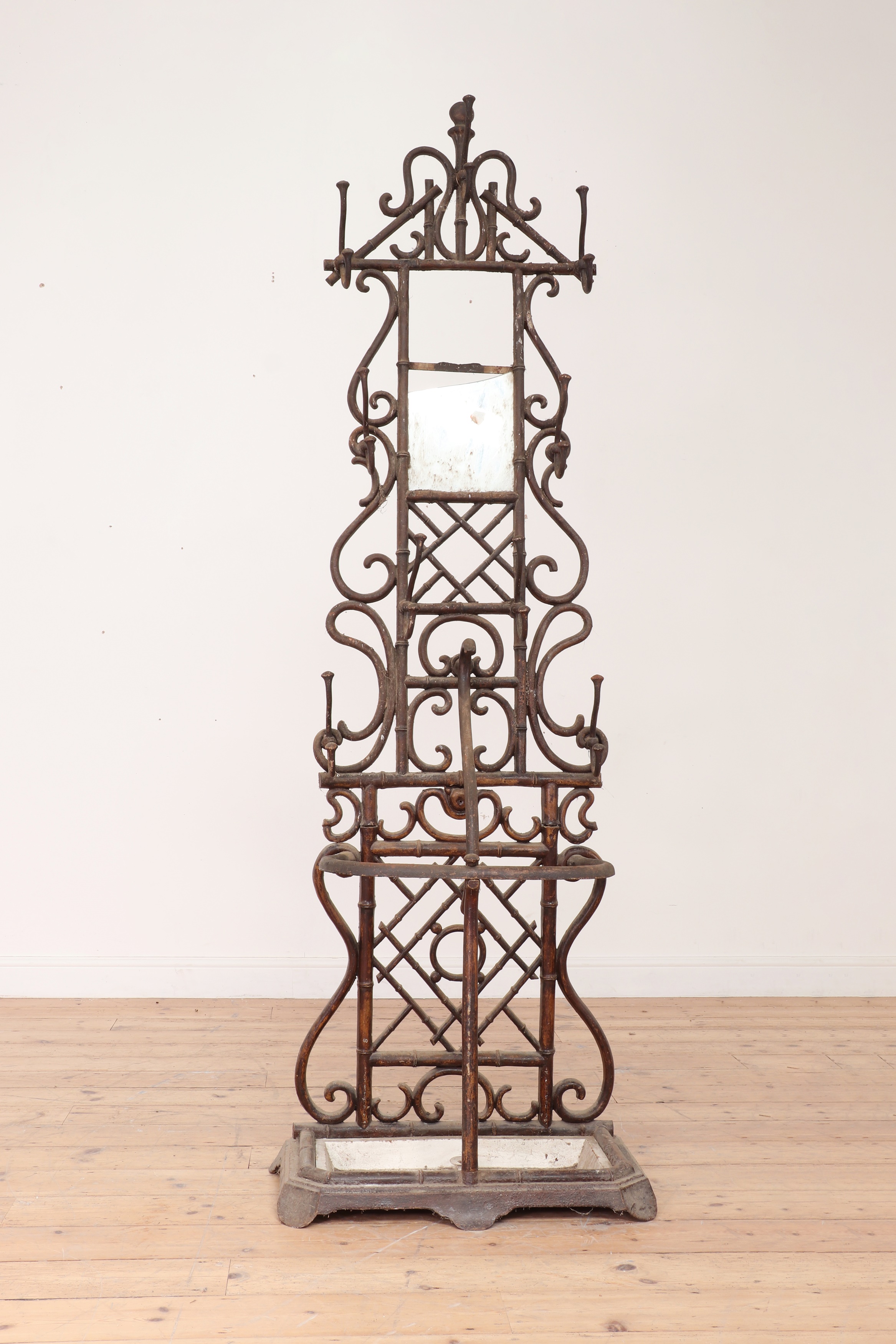 Lot 435 - A faux bamboo cast iron hall stand,