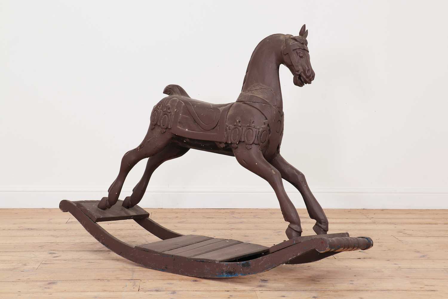 Lot 274 - A carved and painted wooden bow rocking