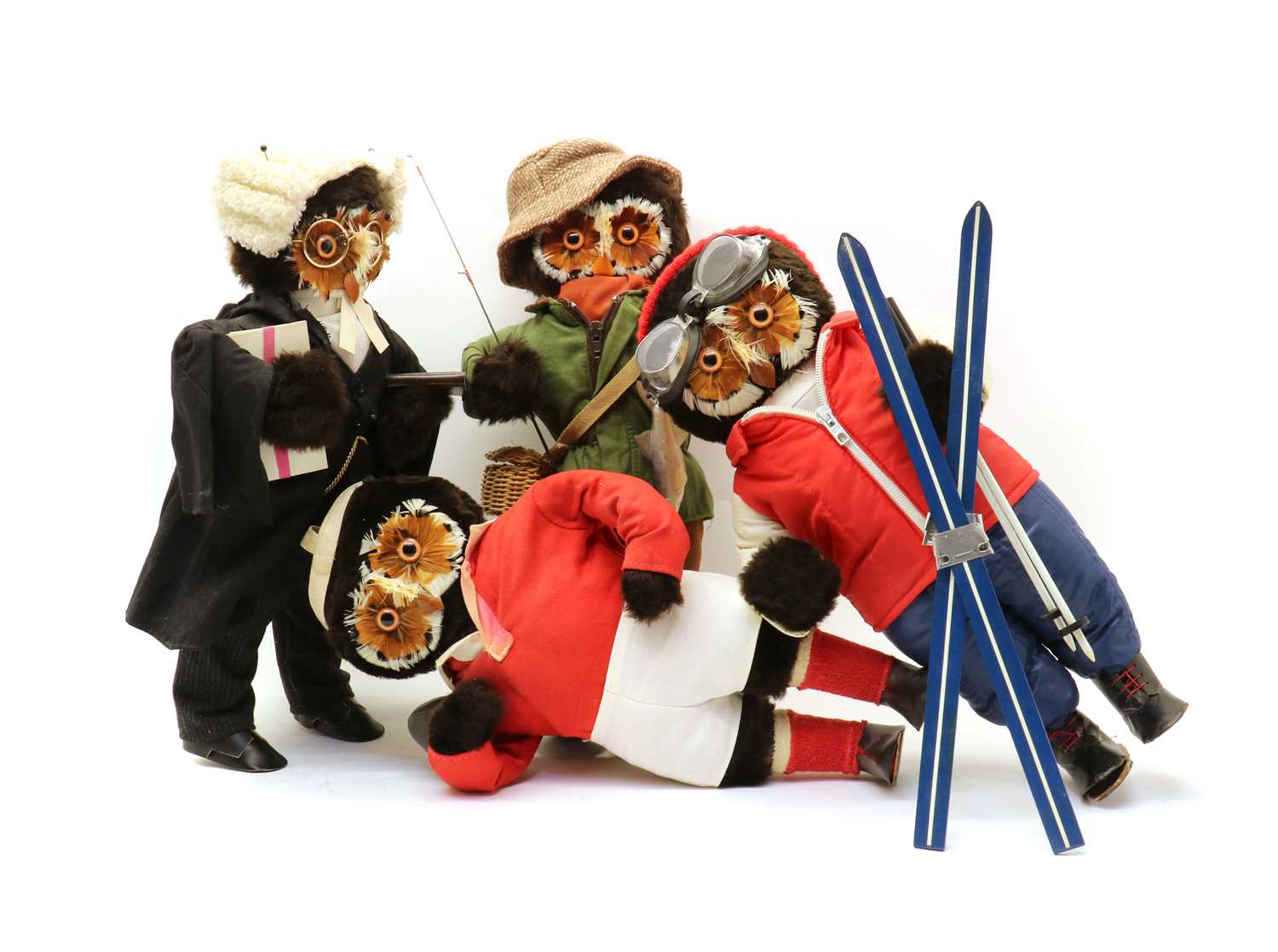 Lot 286 - A collection of four London Owl Company owls