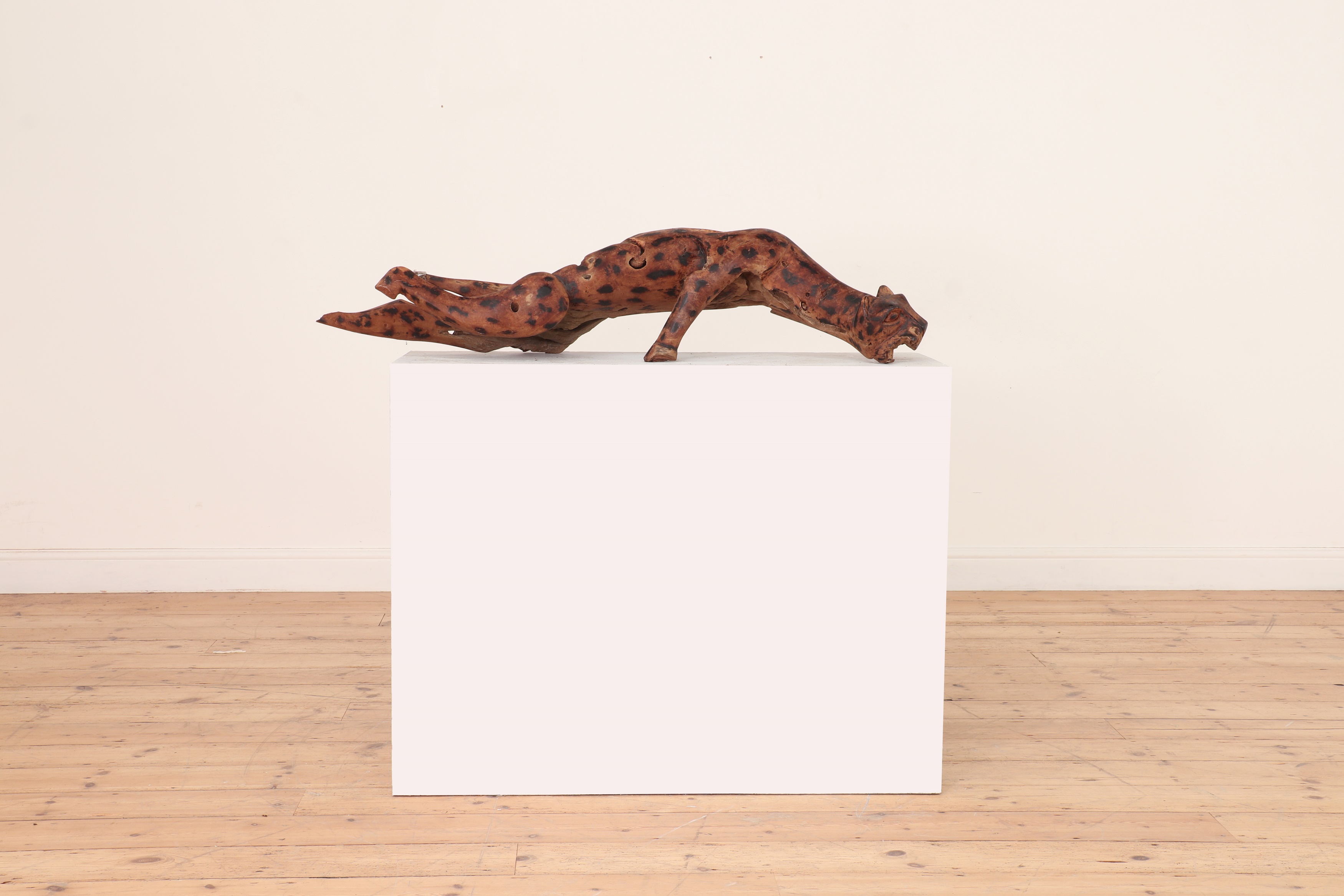 Lot 59 - An African root carving of a leopard,