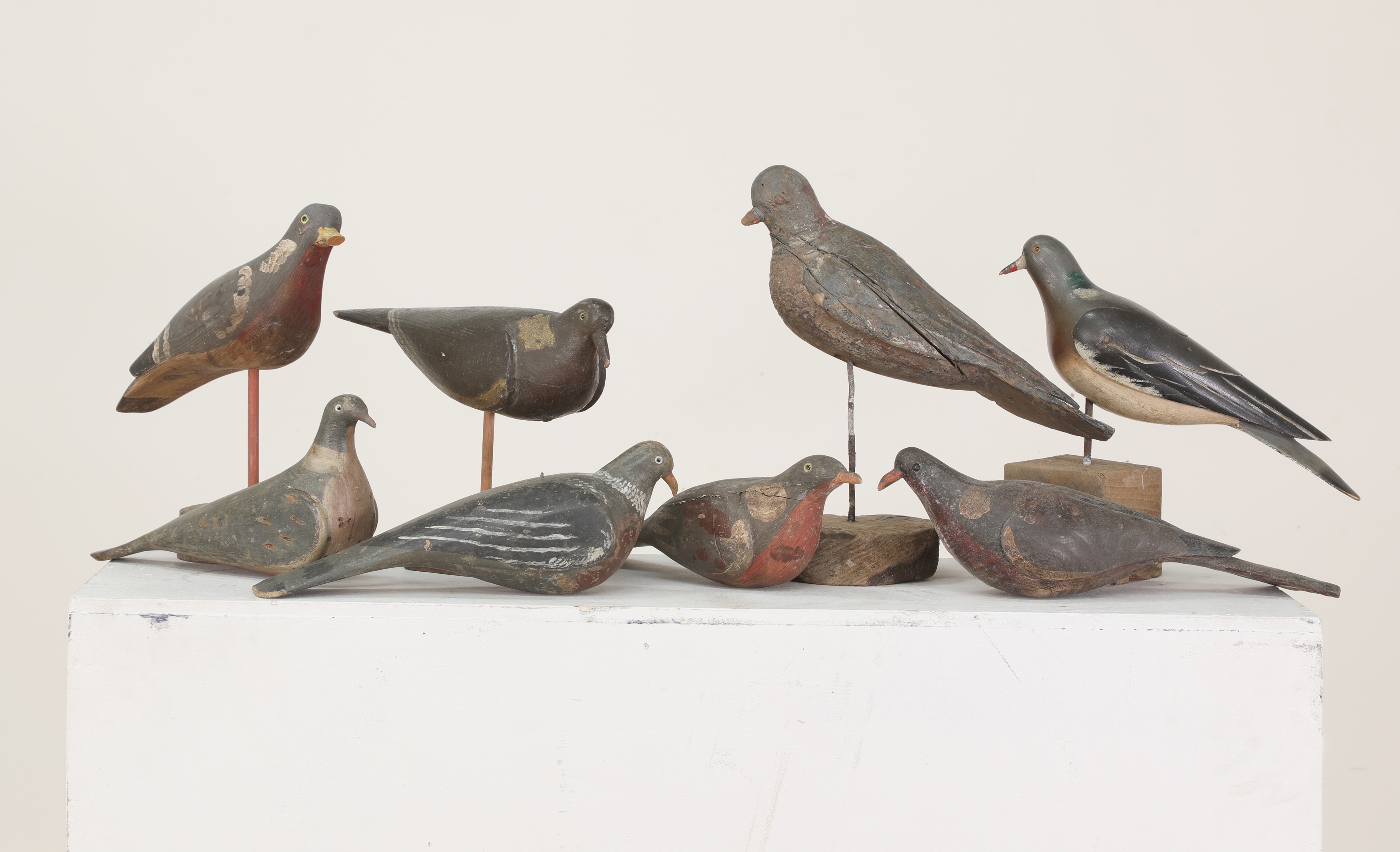 Lot 416 - A flock of carved wooden and painted decoy