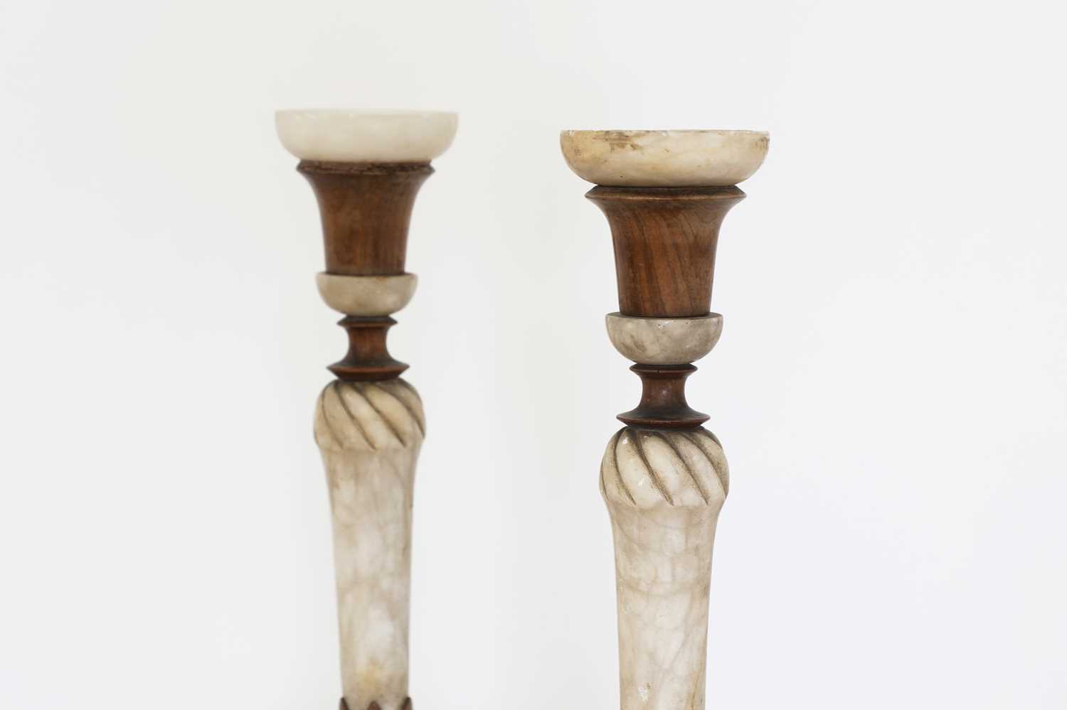 Lot 94 - A pair of Charles X alabaster and fruitwood