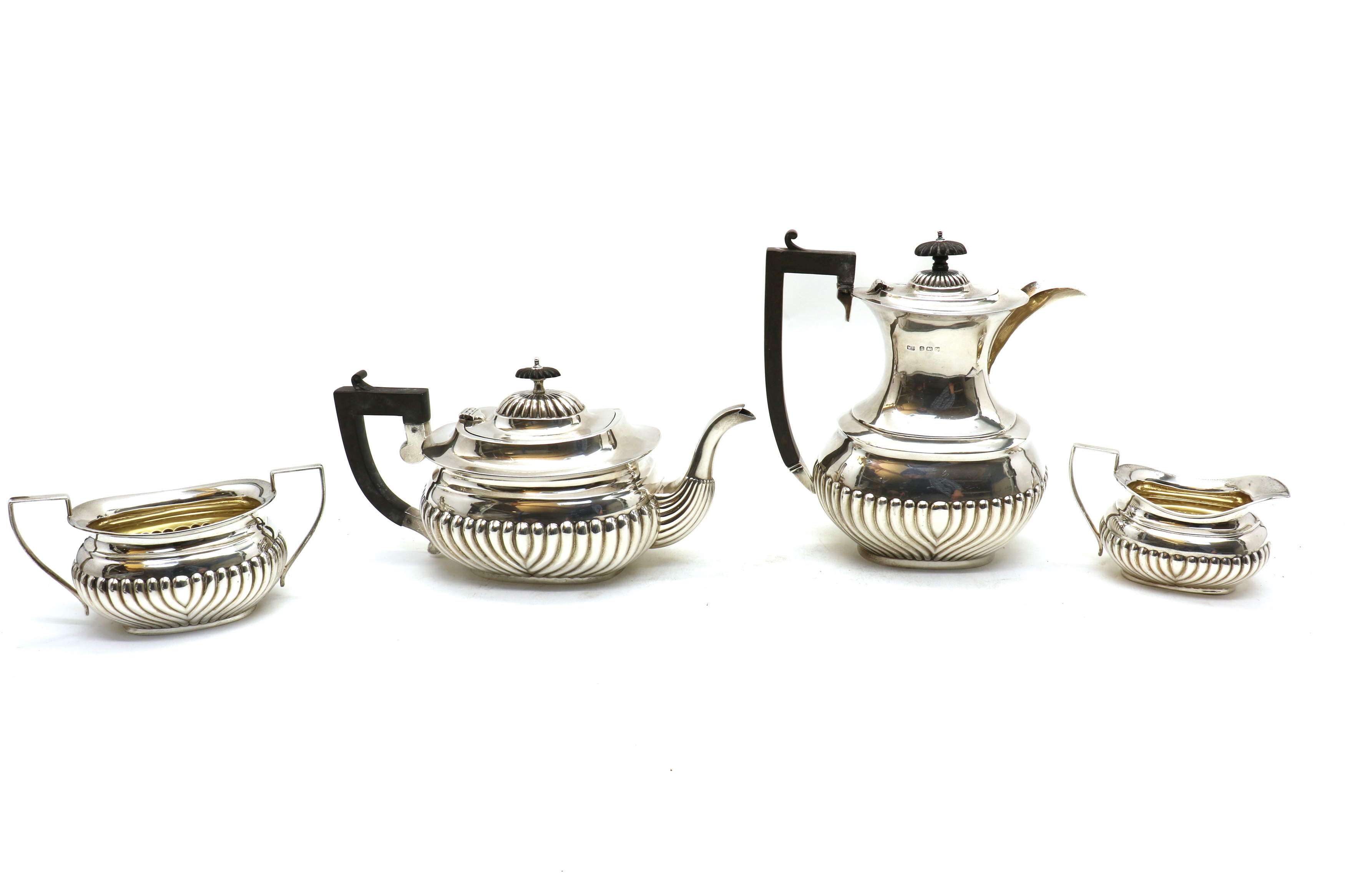 Lot 66 - A Regency style silver four piece tea set,