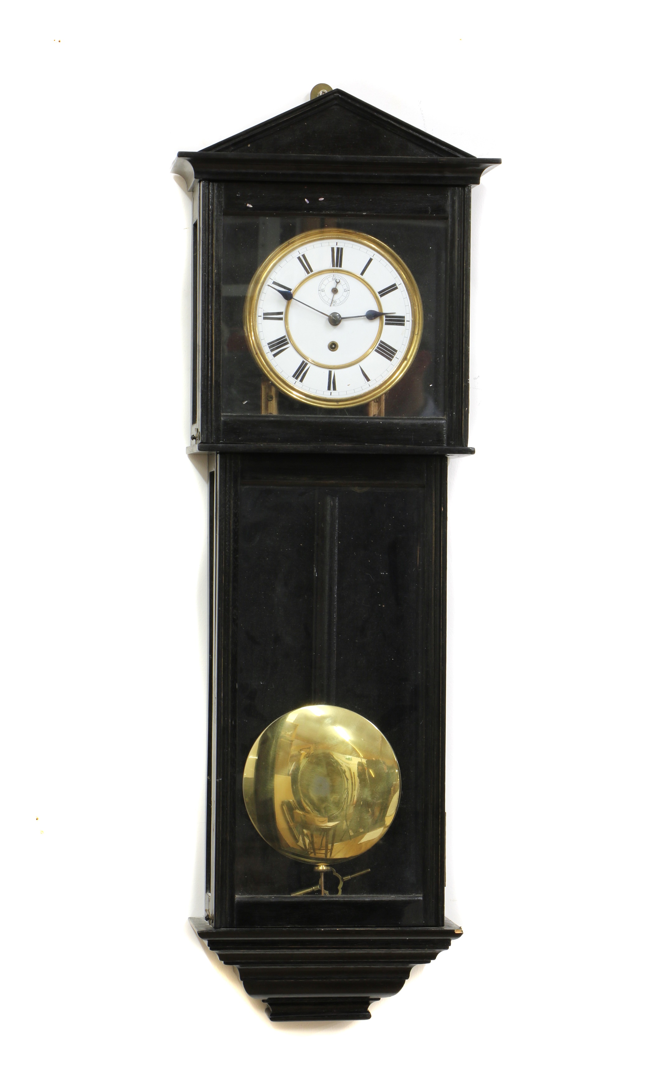 Lot 400 - An ebonised regular wall clock,