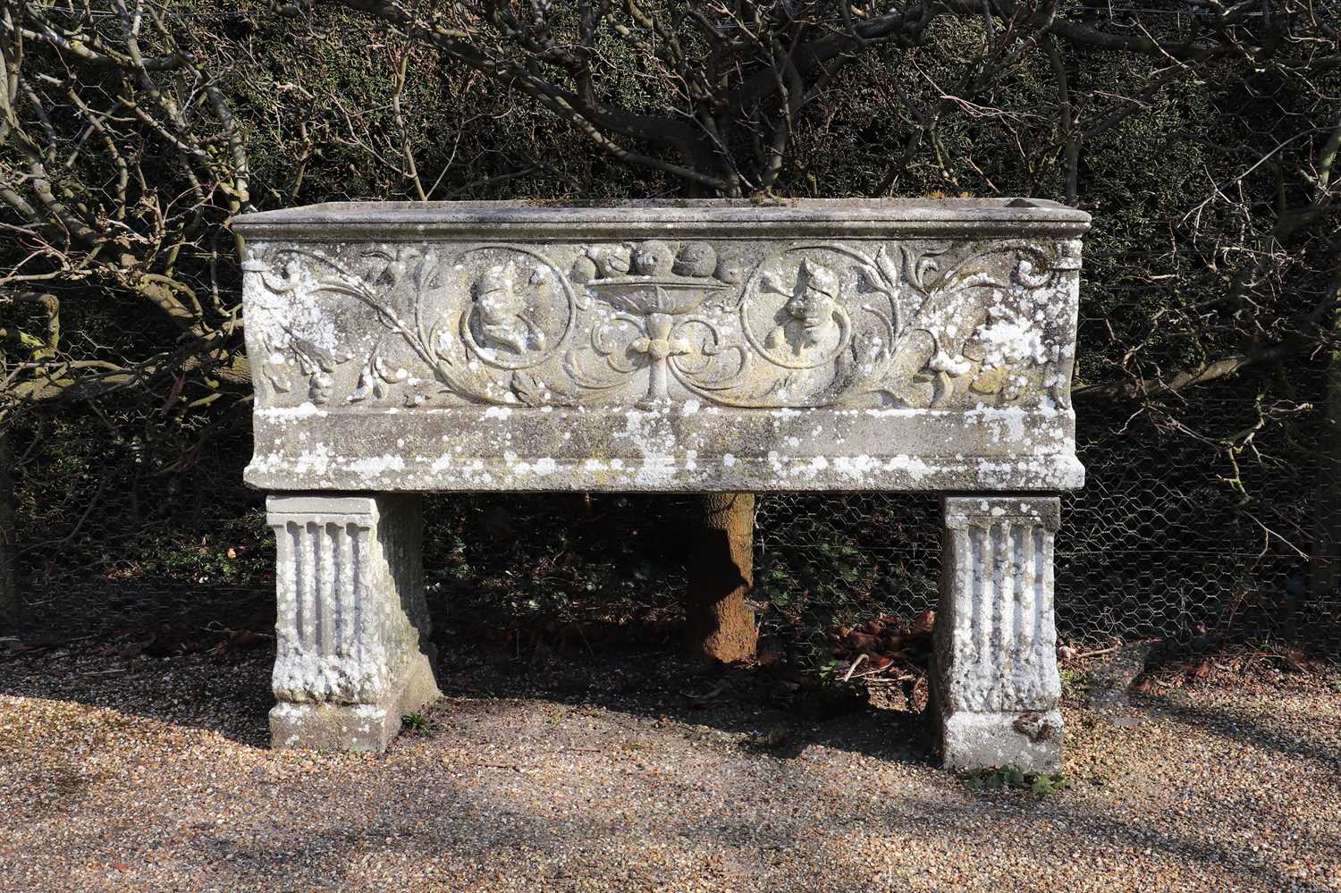 Lot 398 - A composite stone garden trough,