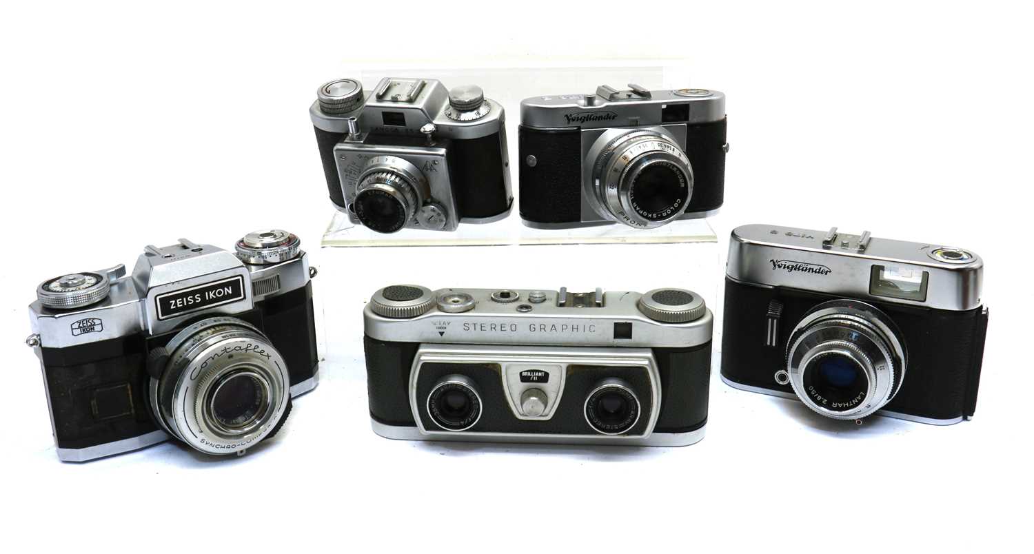 Lot 353 - A collection of five film cameras,