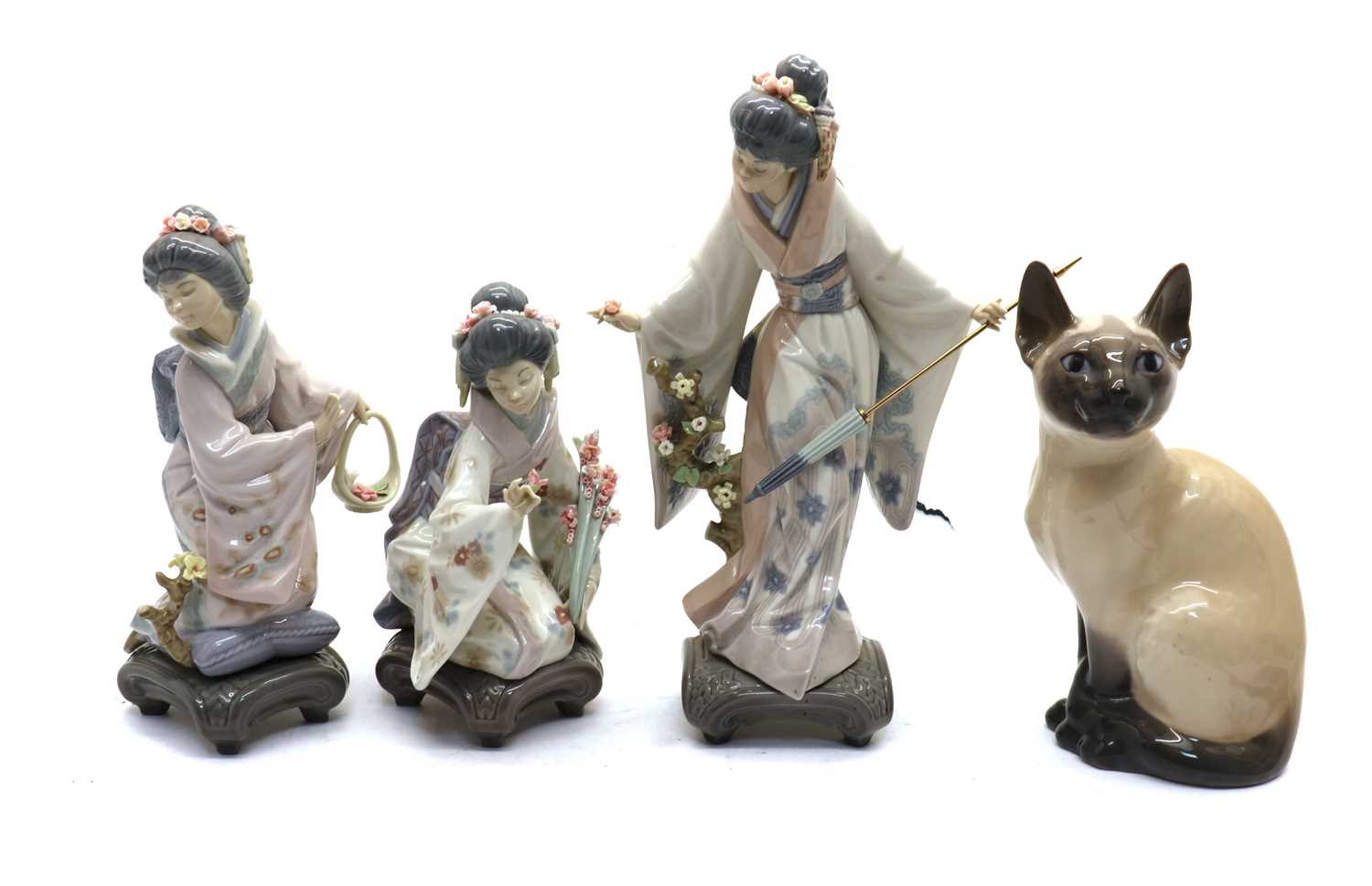 Lot 147 - A collection of Lladro porcelain figures,