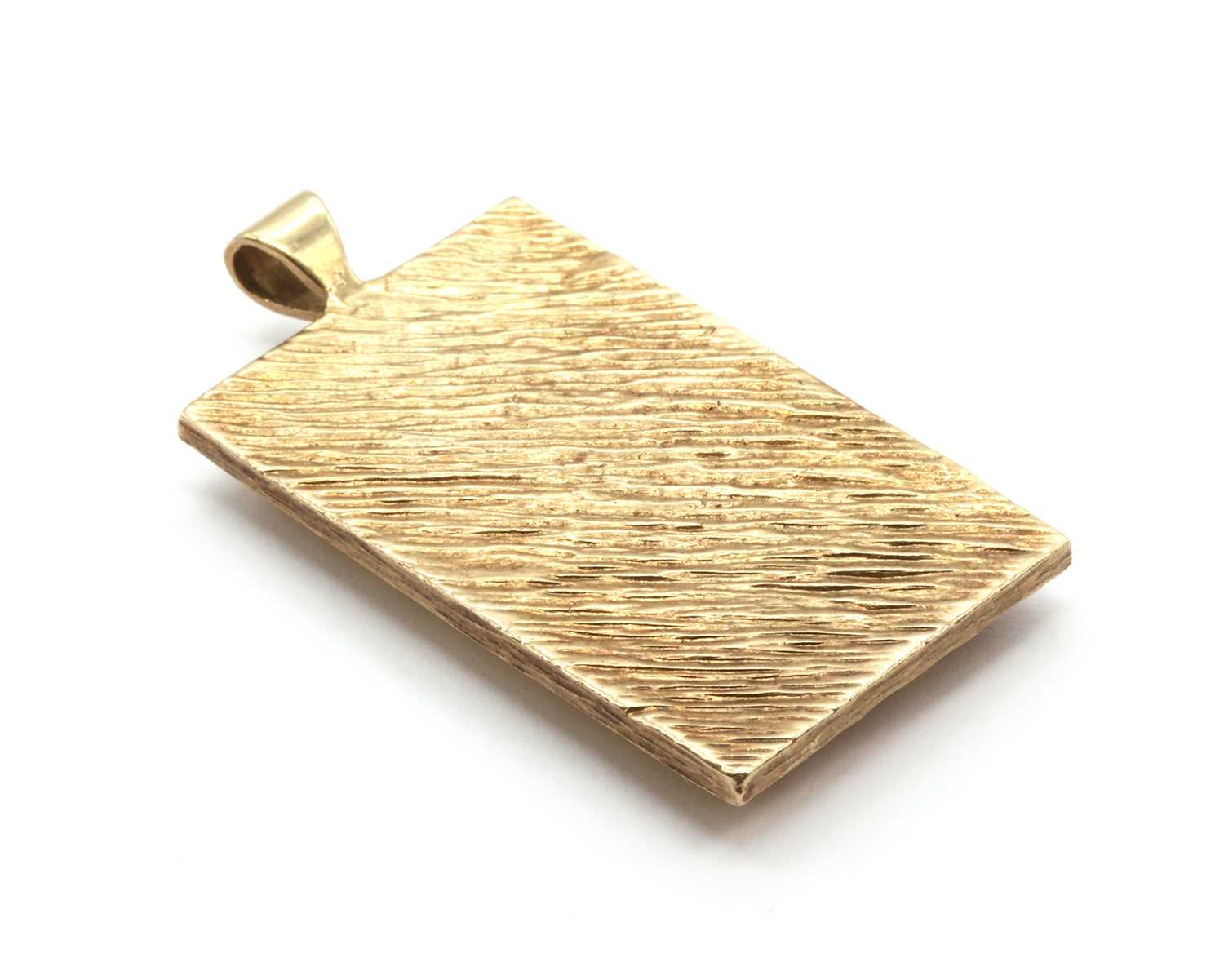 Lot 299 - A gold ingot pendant,