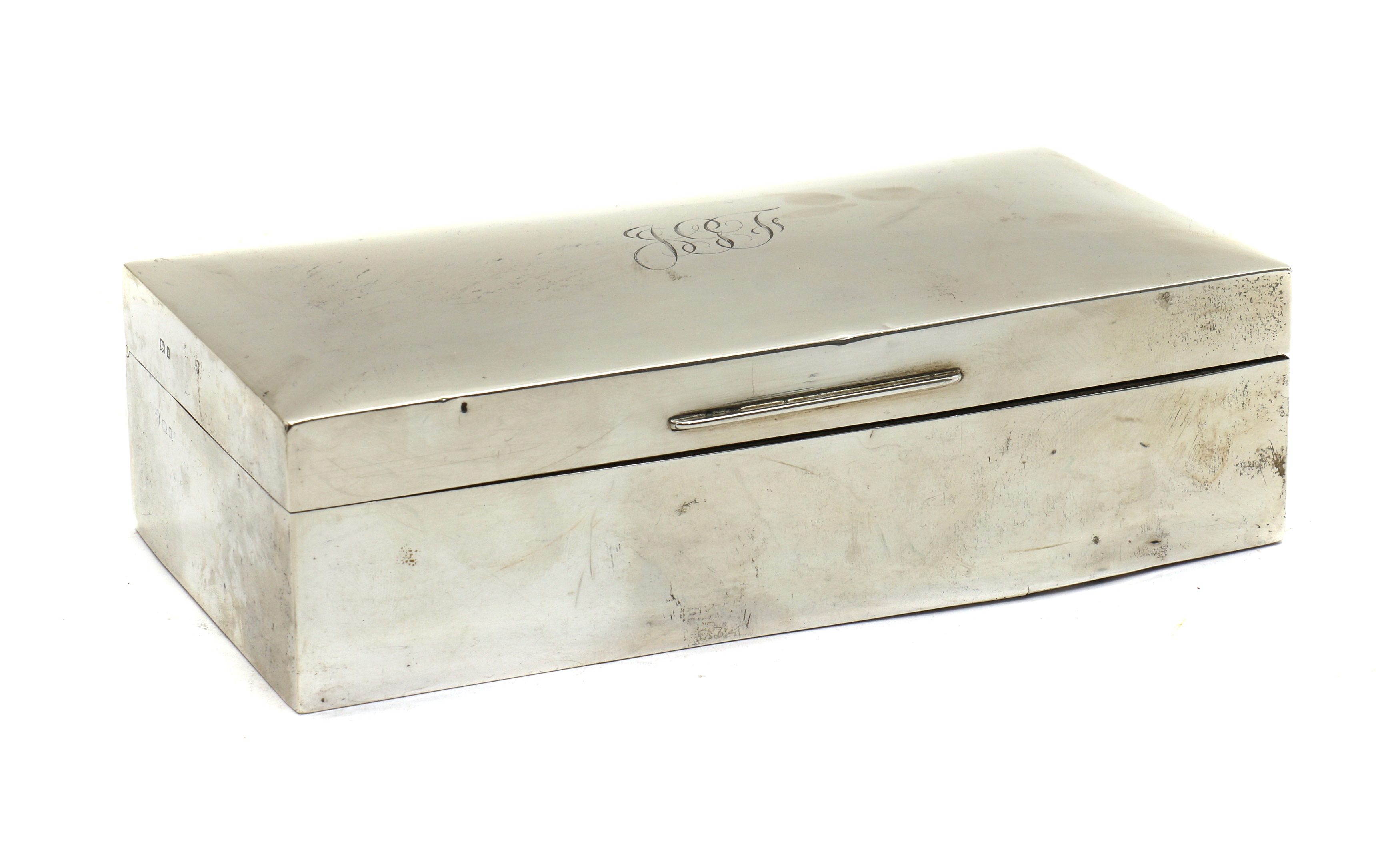 Lot 5 - A silver mounted cigarette box