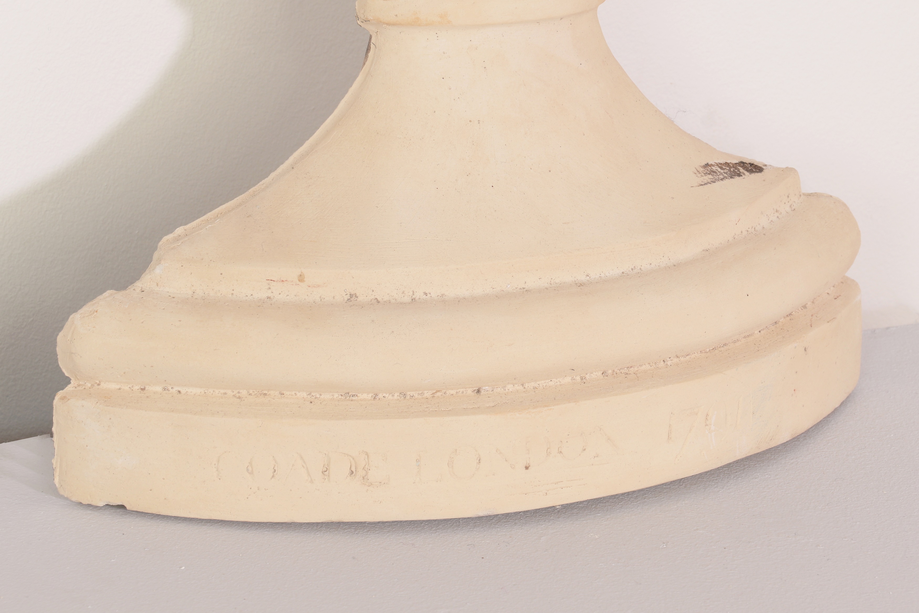 Lot 378 - A pair of flat-back cast composite stone