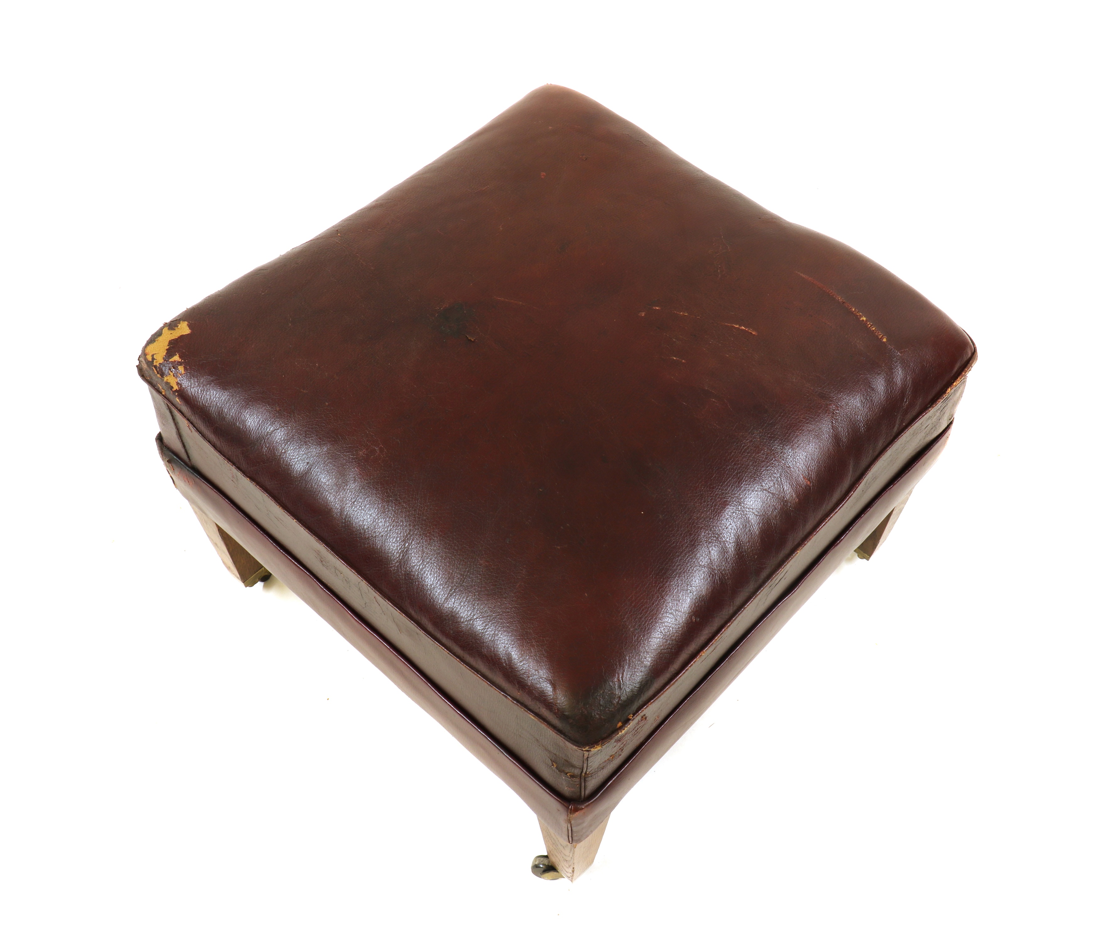 Lot 345 - A red leather upholstered footstool in the