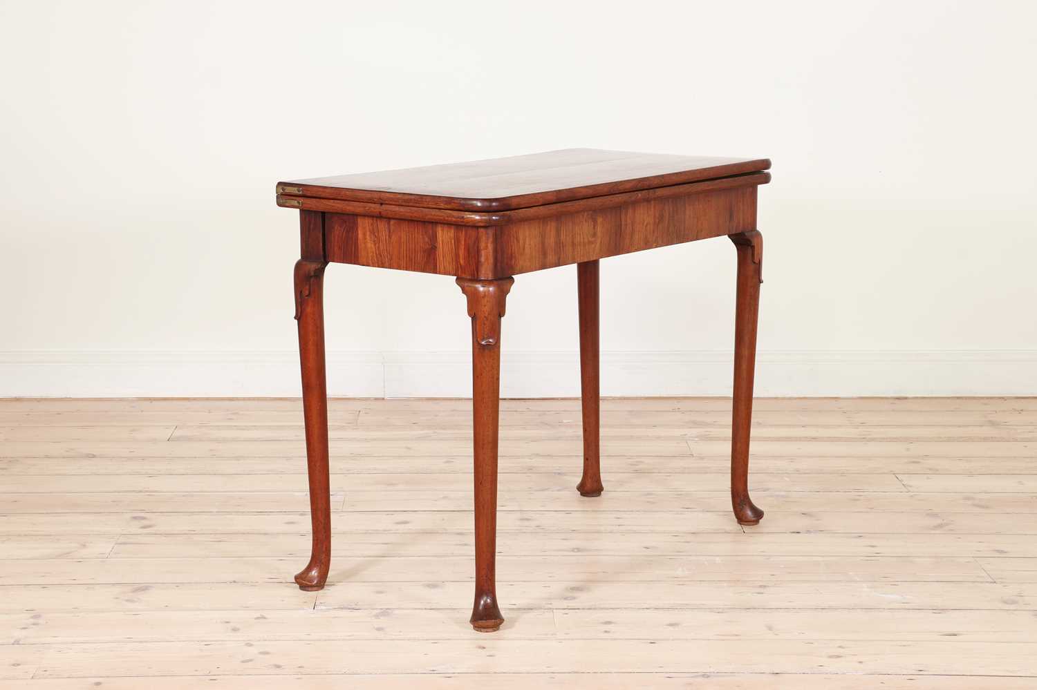 Lot 17 - A George I padouk card table,