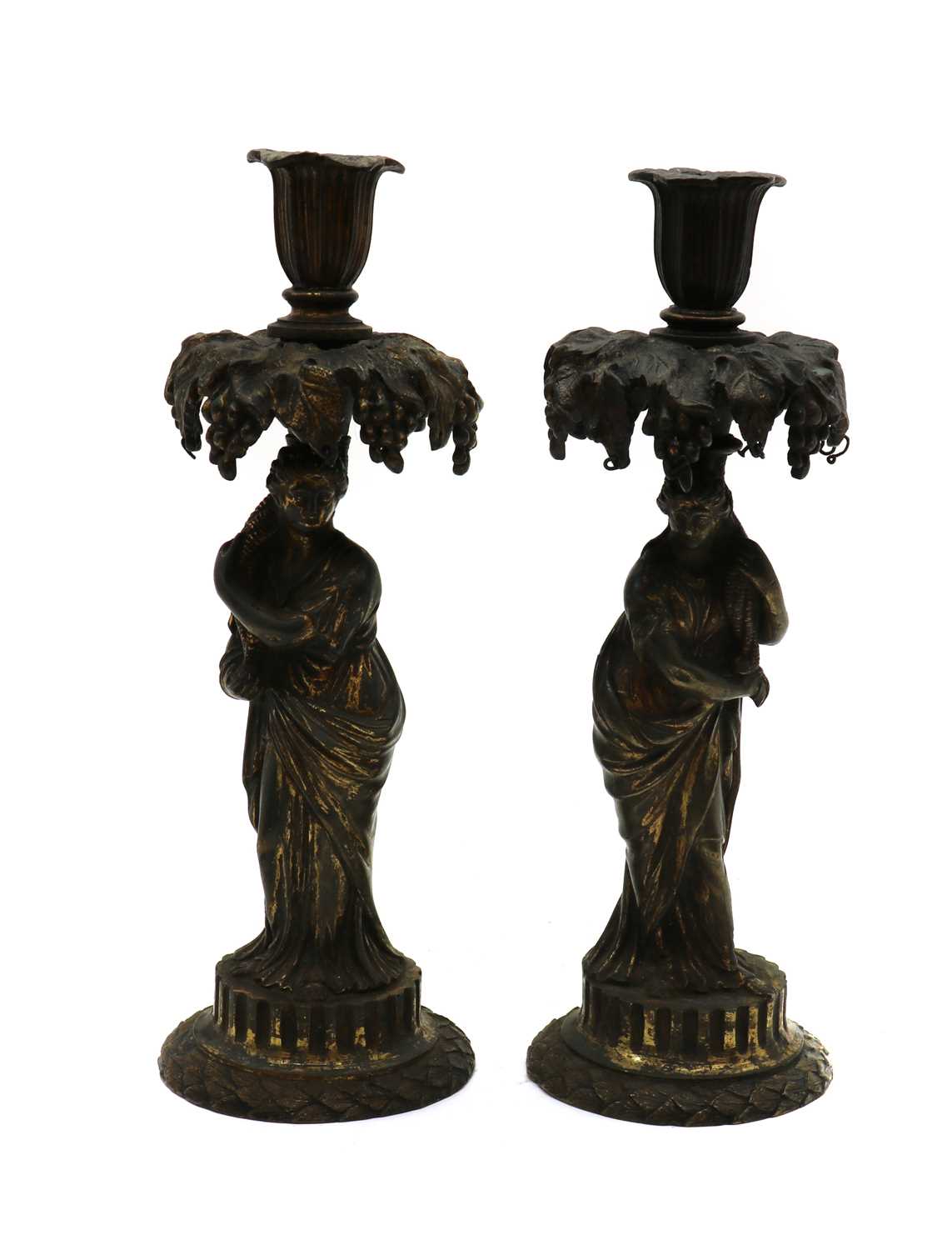 Lot 278 - A pair of gilt metal figural candlesticks,