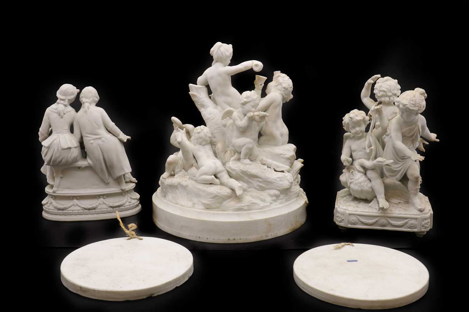 Lot 83 - A Parian ware figure group,