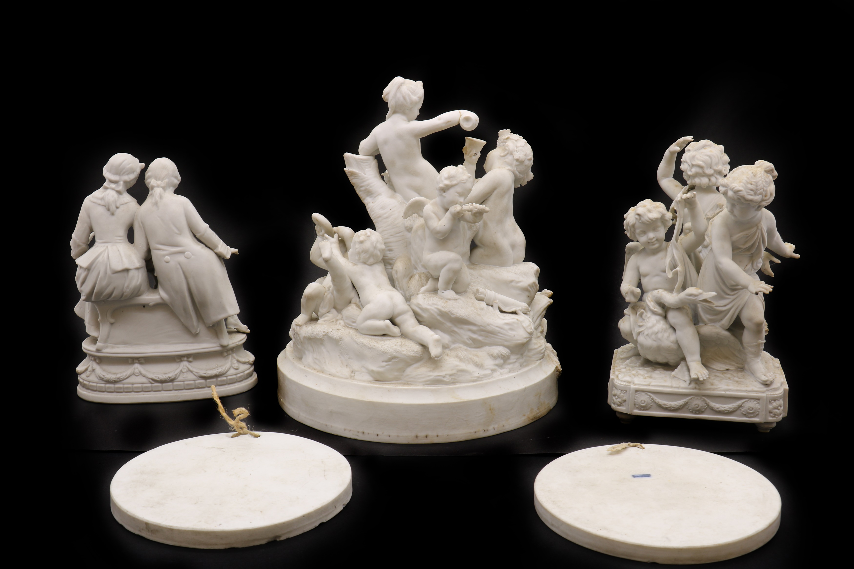 Lot 83 - A Parian ware figure group,
